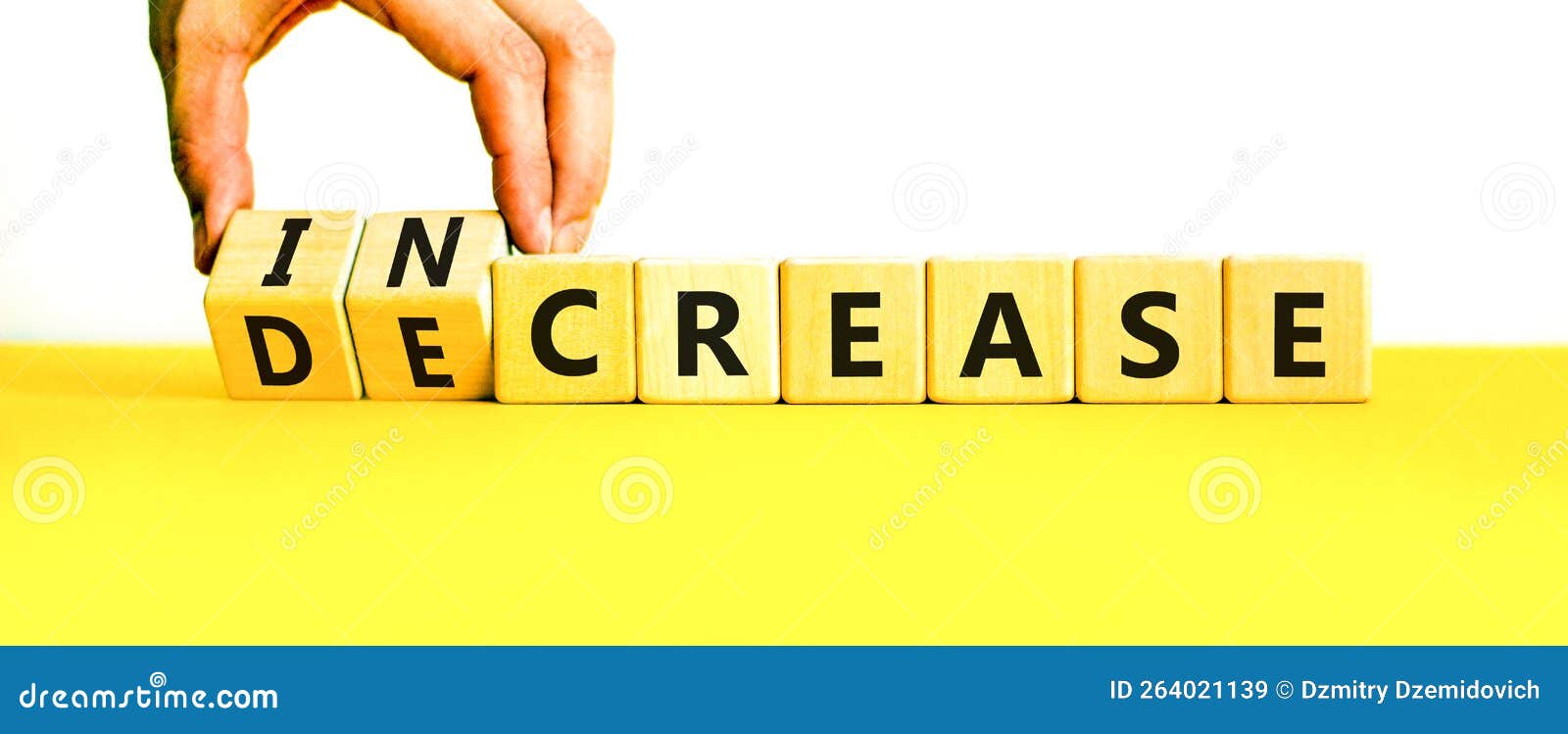 Increase or Decrease Symbol. Concept Words Increase and Decrease on Wooden Cubes. Businessman ...