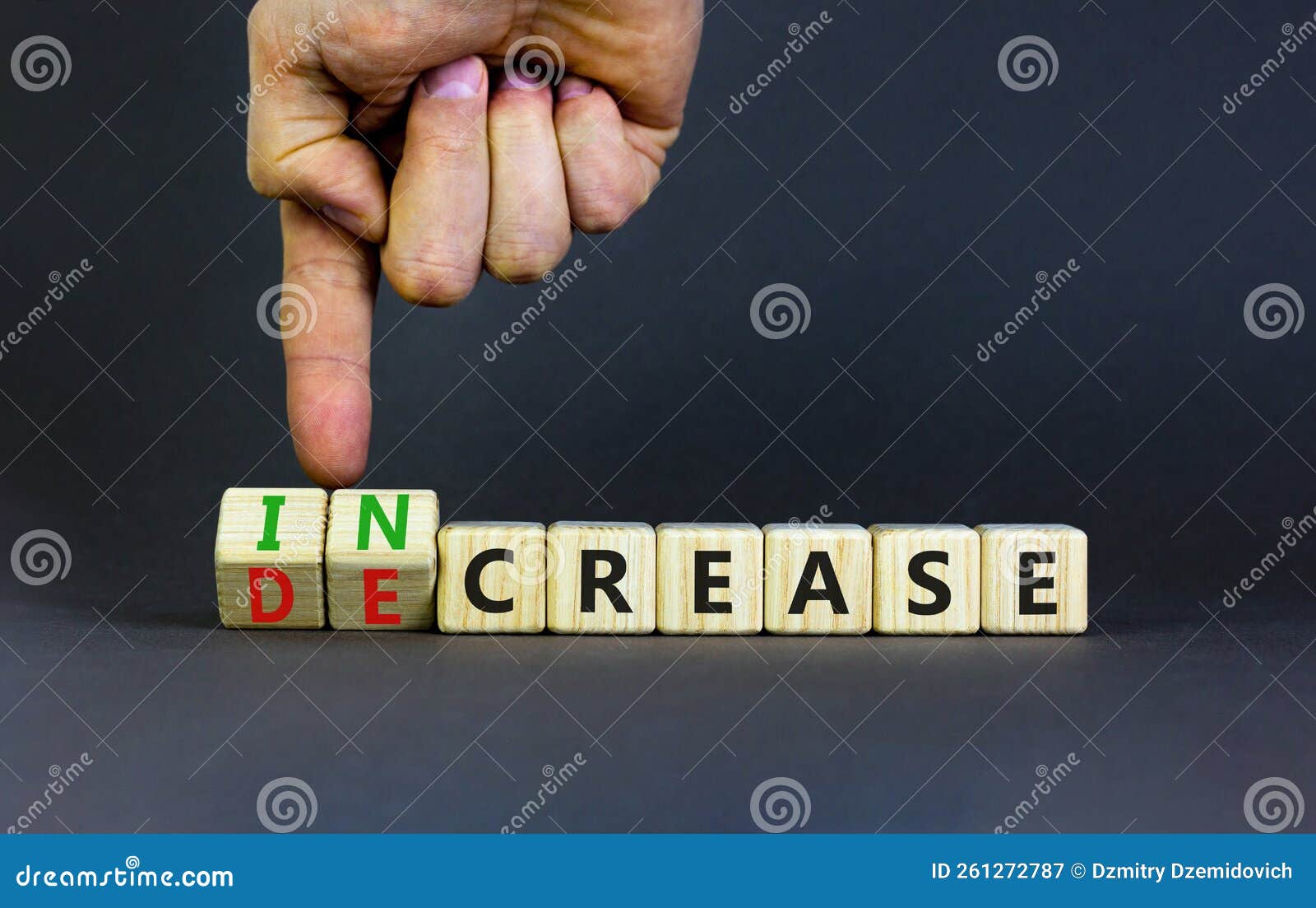 Increase or Decrease Symbol. Concept Words Increase and Decrease on Wooden Cubes. Businessman ...