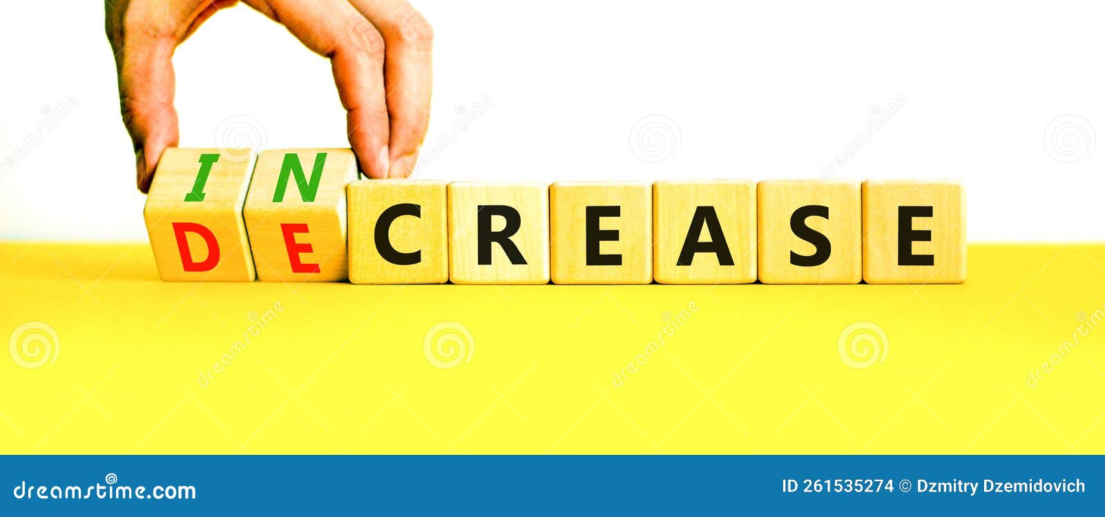 Increase or Decrease Symbol. Concept Words Increase and Decrease on Wooden Cubes. Businessman ...