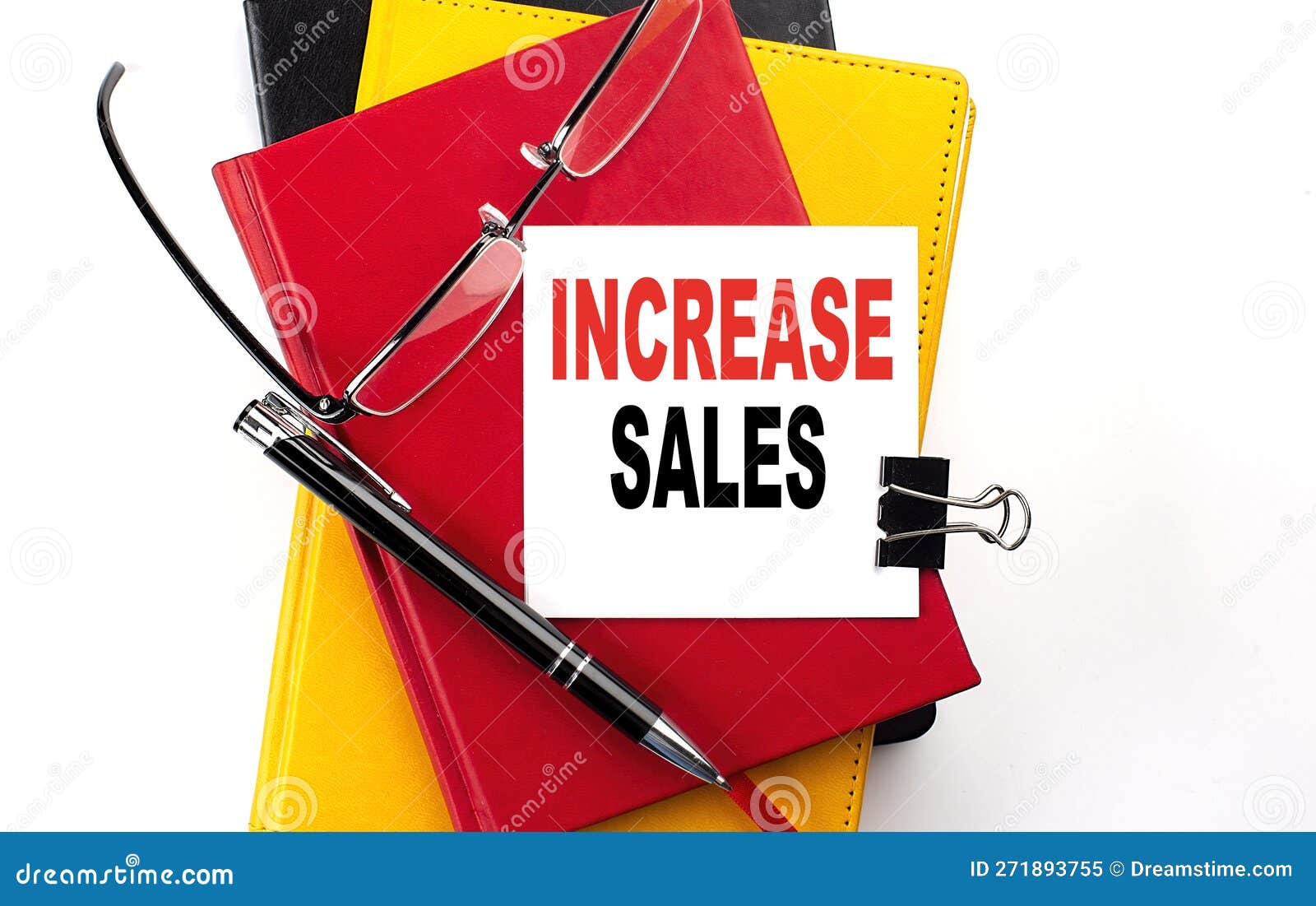 INCREASE SALES Text Written on a Sticky on Colorful Notebooks Stock ...