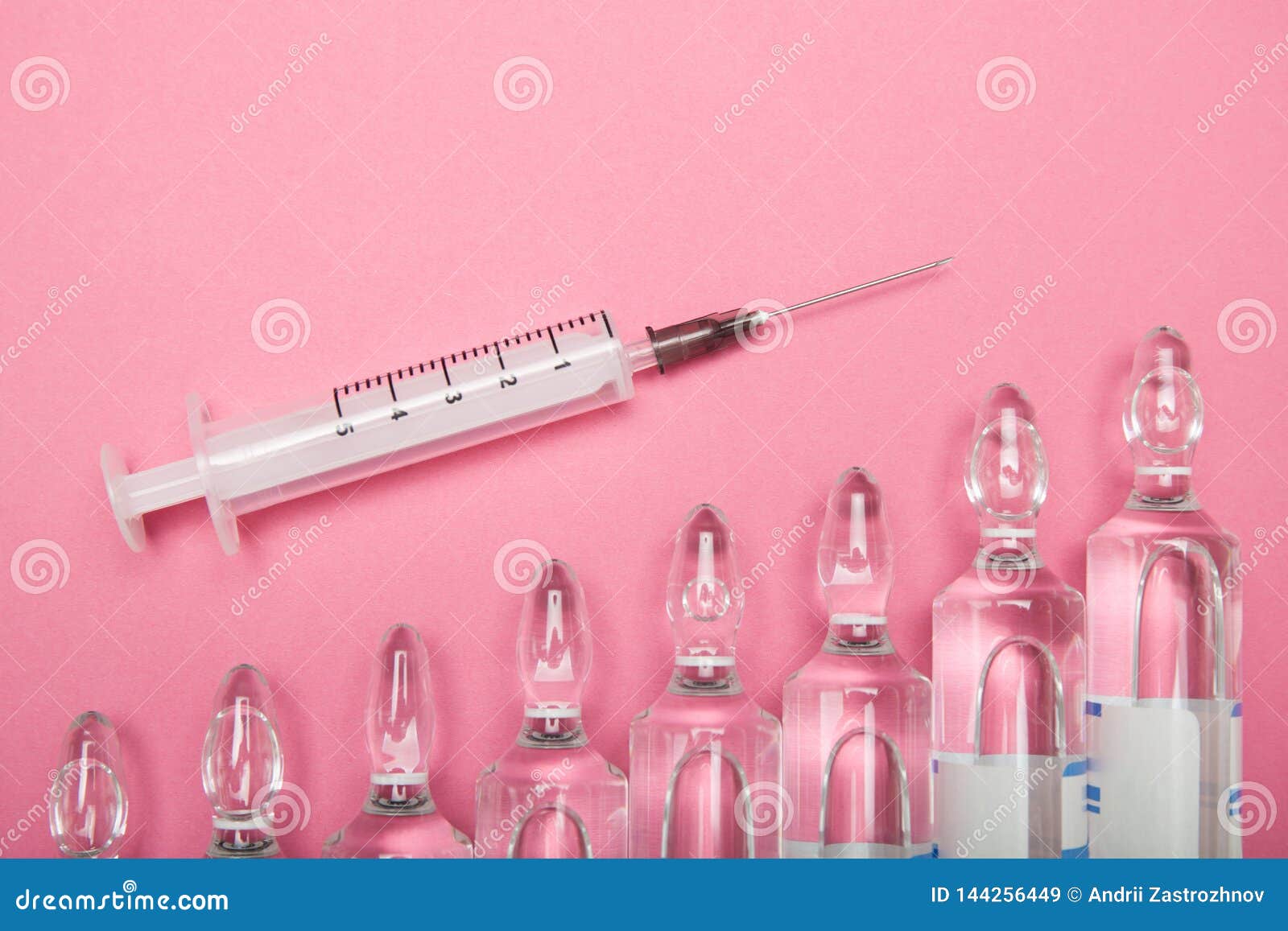 Increasing Dependence on Injections. Syringe and Ampoules on a Pink ...