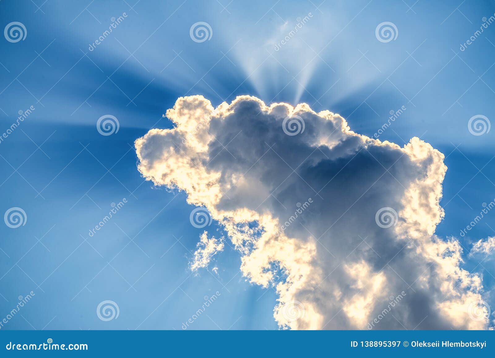 Incredibly Dramatic Clouds with the Bright Rays of the Sun that Breaks ...