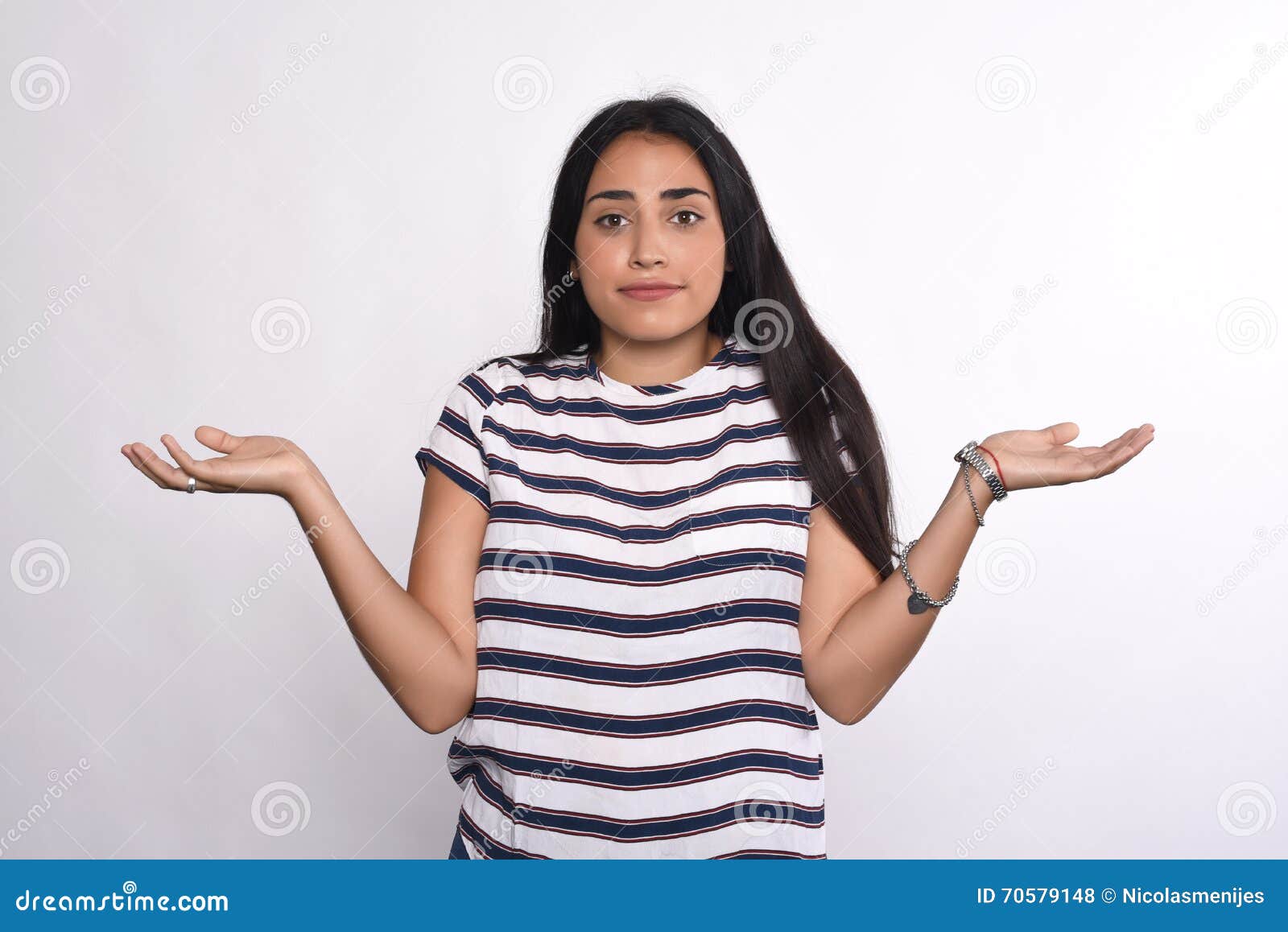 Indecisive young woman stock photo. Image of doubt, gesturing - 70579148