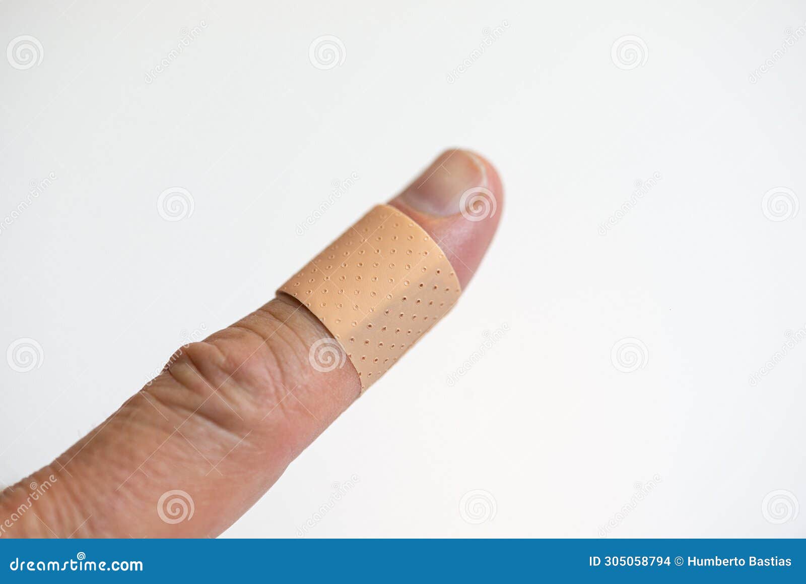 Index finger with band aid stock photo. Image of injury - 305058794