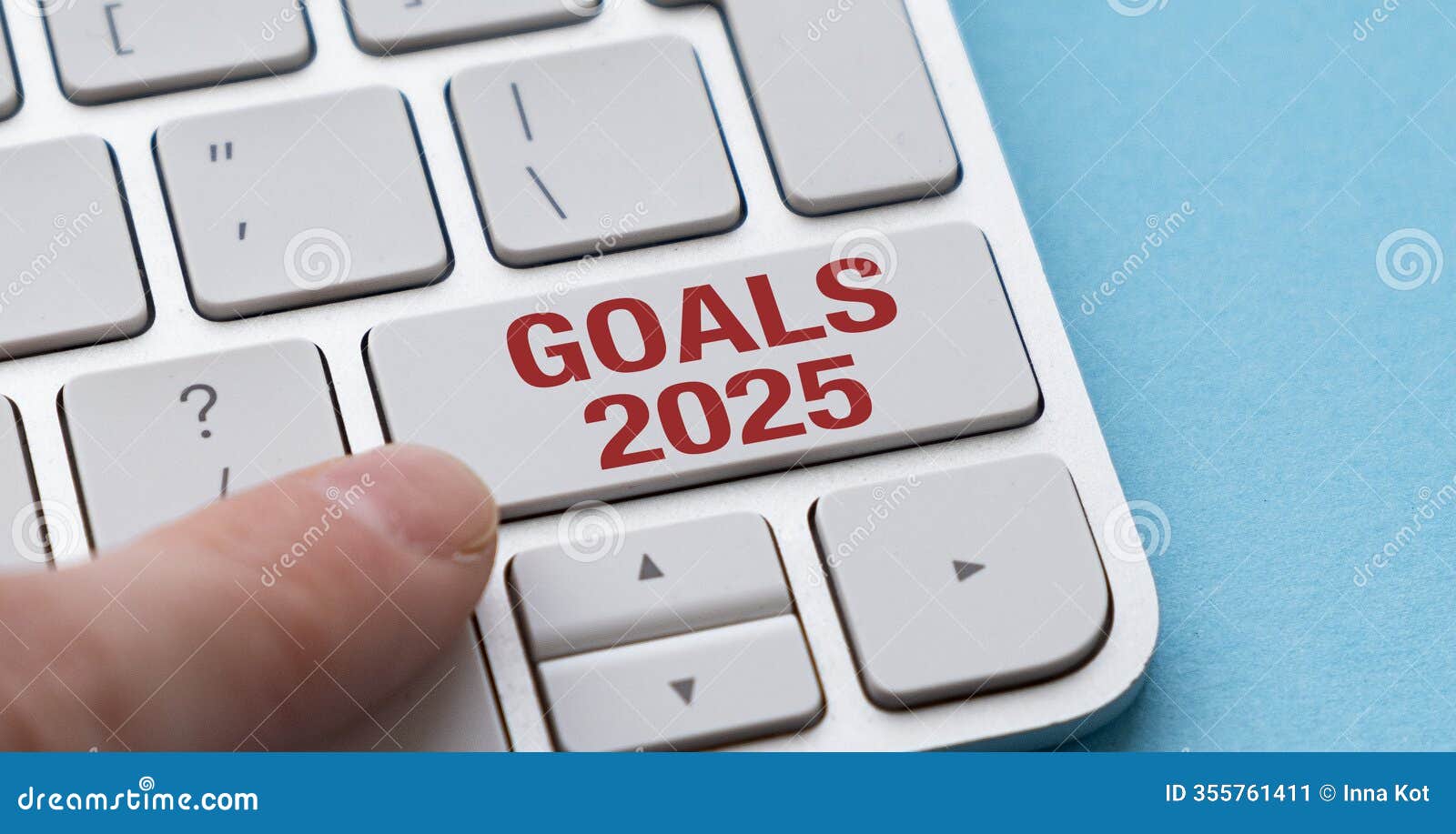 The Index Finger is Directed To the Keyboard Button with the Text Goals ...