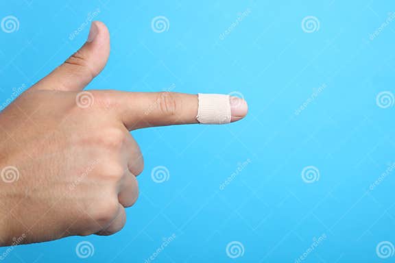 Finger with a plaster stock image. Image of injury, blue - 101009343
