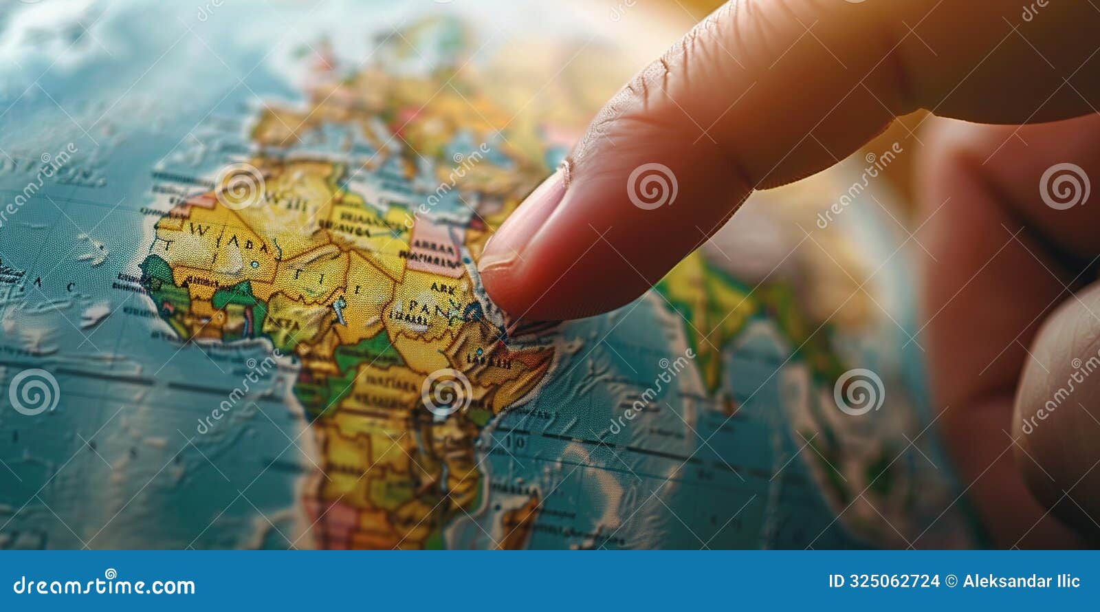 Index Finger Pointing at the Tiny Globe. Geography Concept Stock ...