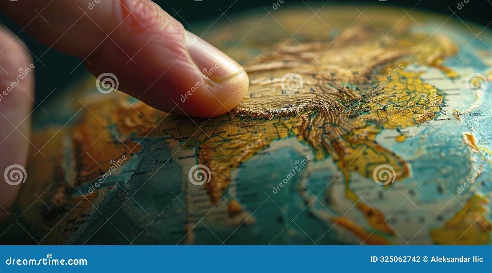 Index Finger Pointing at the Tiny Globe. Geography Concept Stock ...