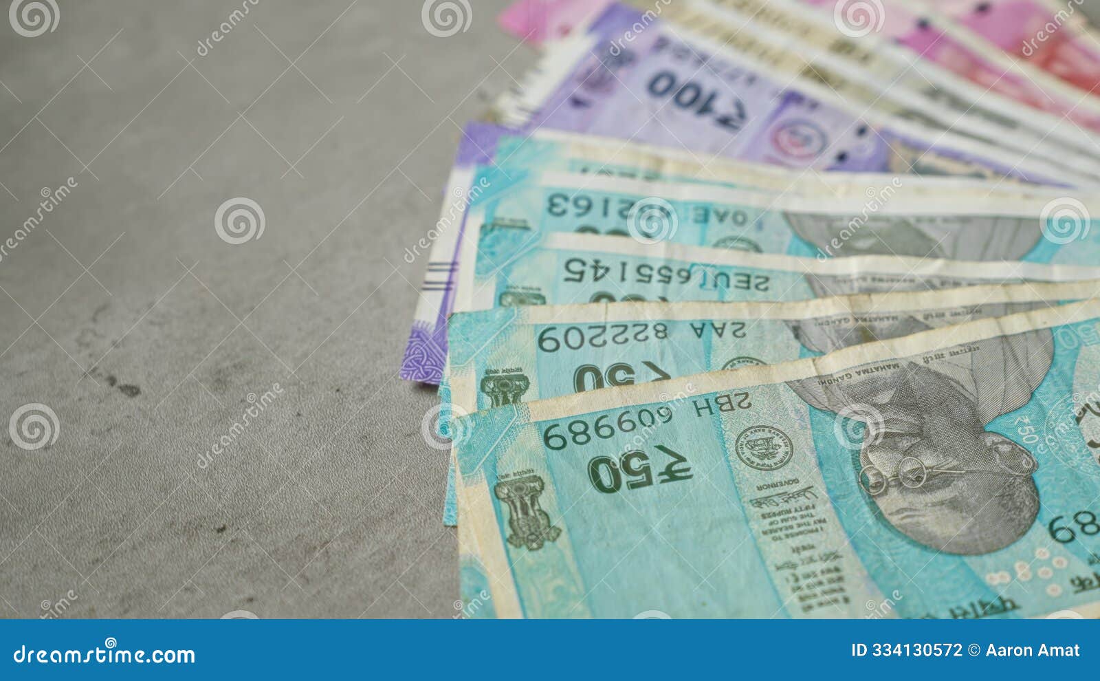 Indian Banknotes Positioned Neatly on a Concrete Surface with Various ...