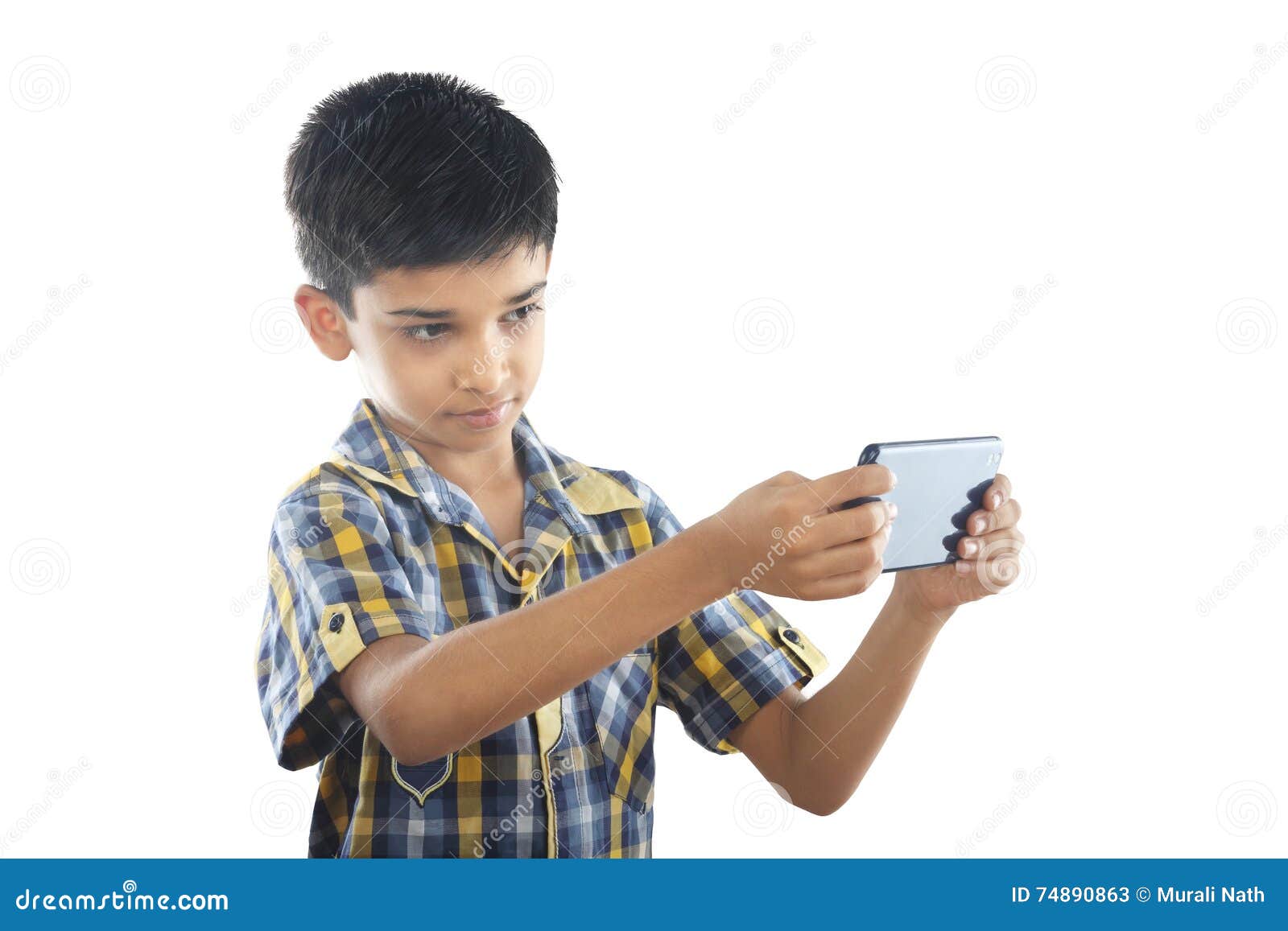 Indian boy holding tablet stock image. Image of equipment - 74890863