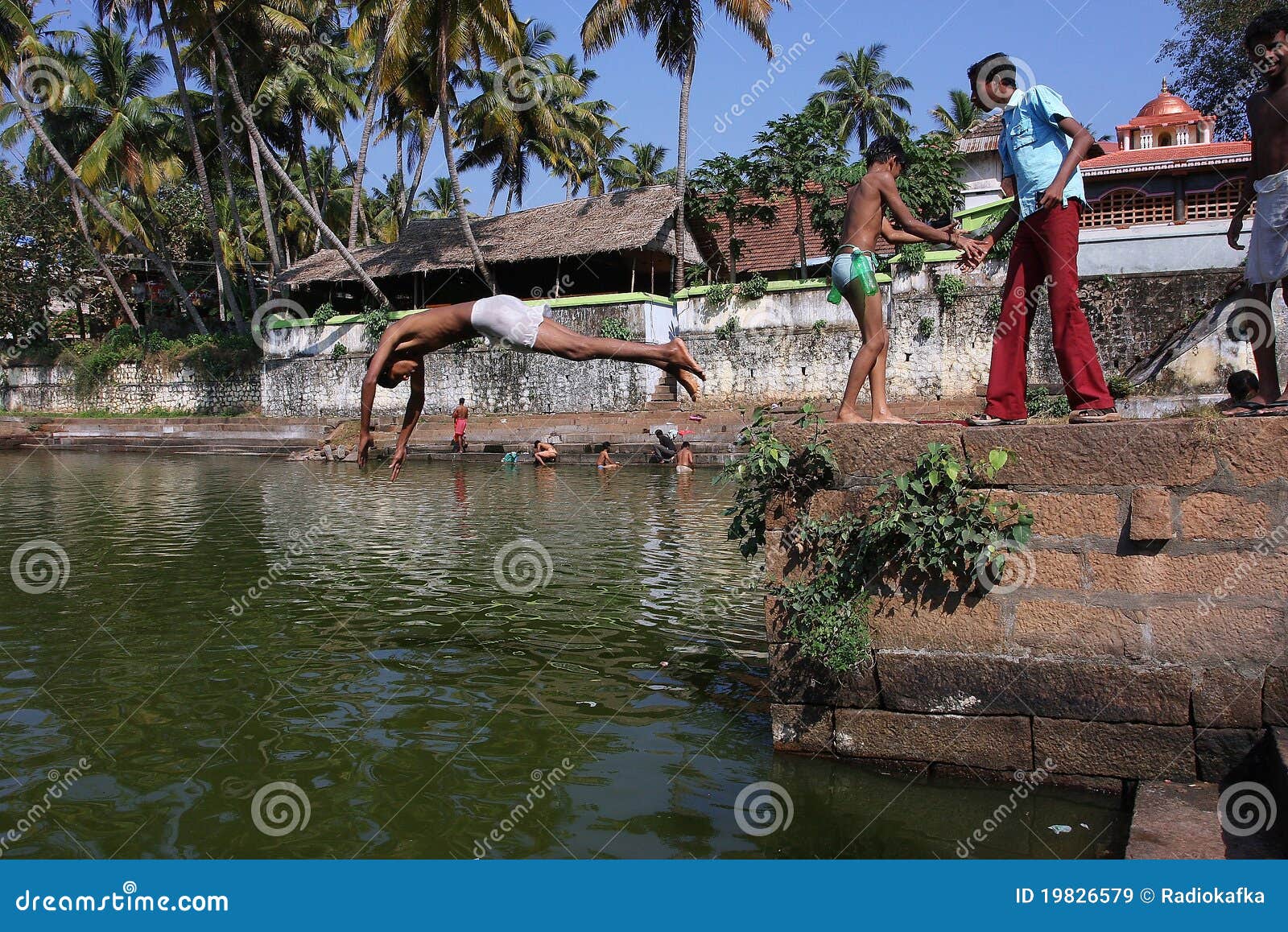 Indian Boys Swimming In The Sacred Water Of The River Ganges In The ...