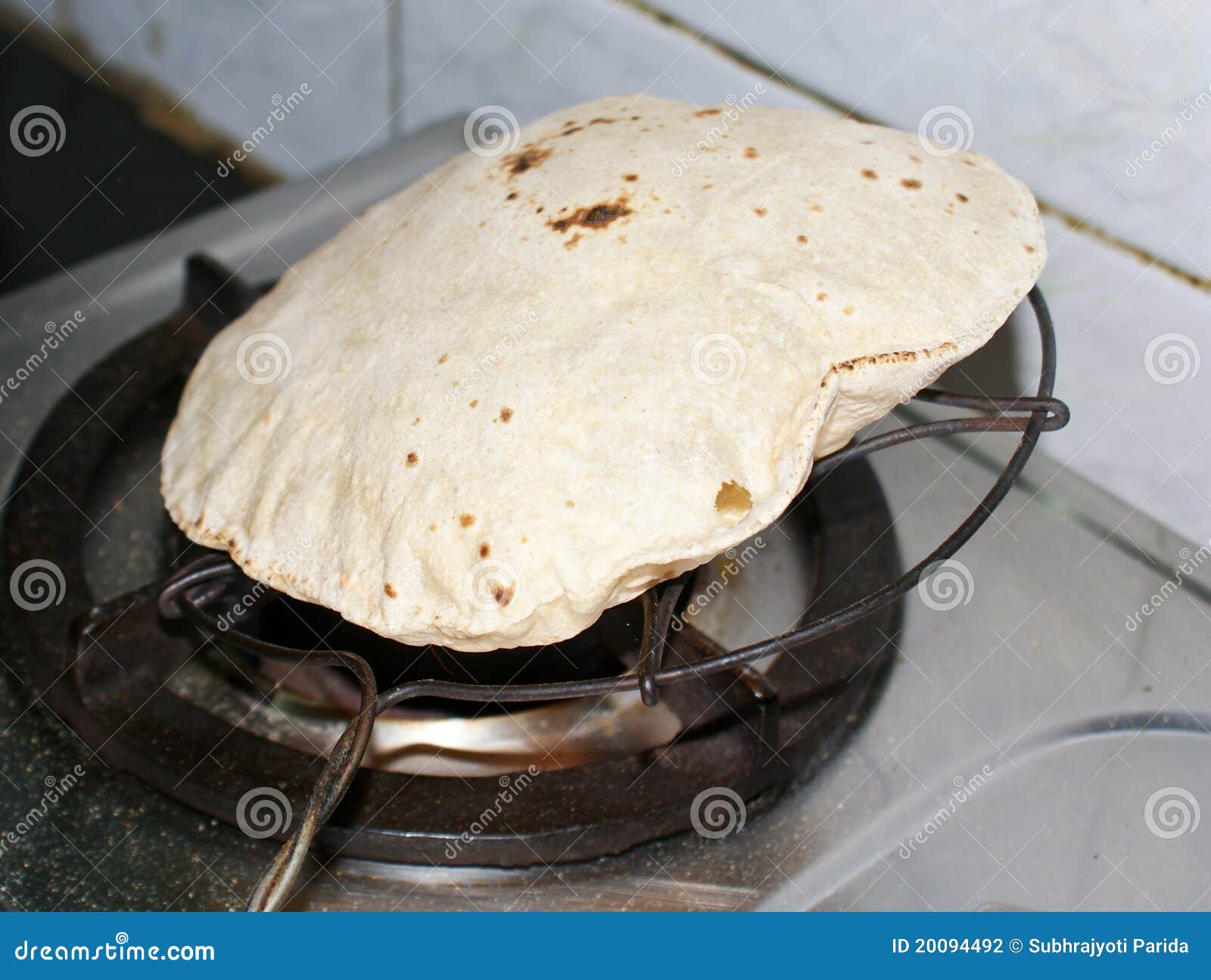 Indian Bread,Roti, Being Blown Over Oven Stock Photo - Image of blown ...