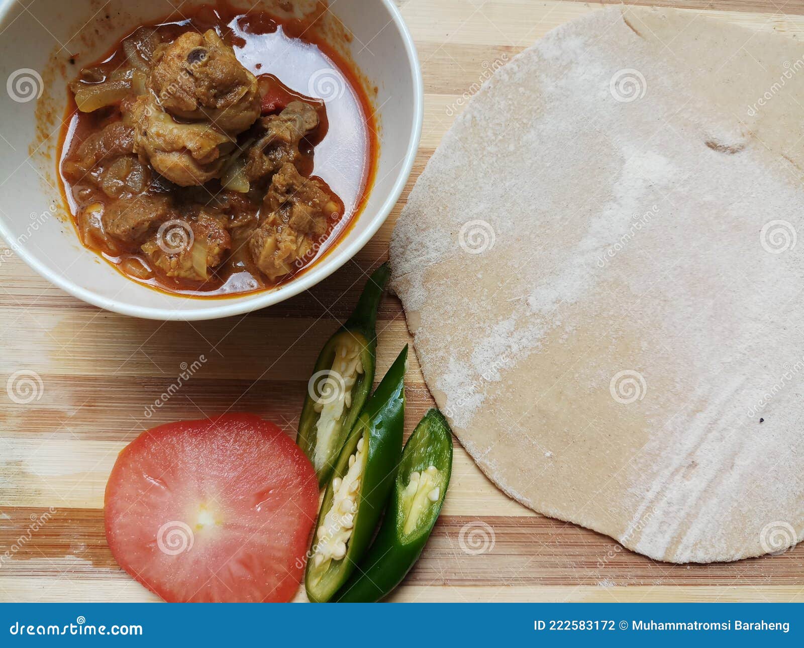 Indian Breakfast with Chicken Curry, Chapati Bread and Vegetable on ...