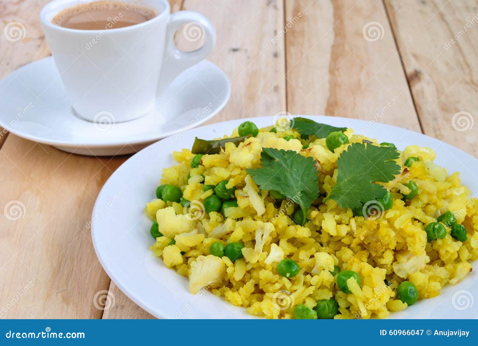 Indian breakfast Poha stock image. Image of chilli, peas - 60966047