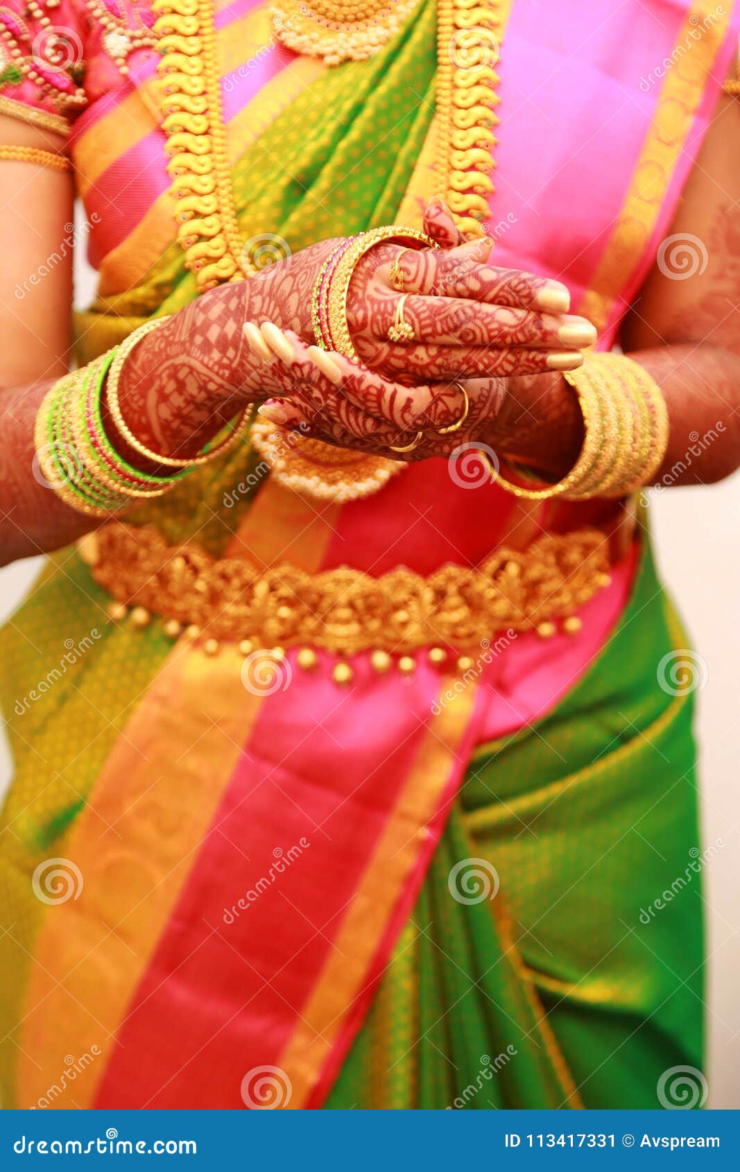 Indian Bride Putting on Bangles Stock Image - Image of hand, style ...