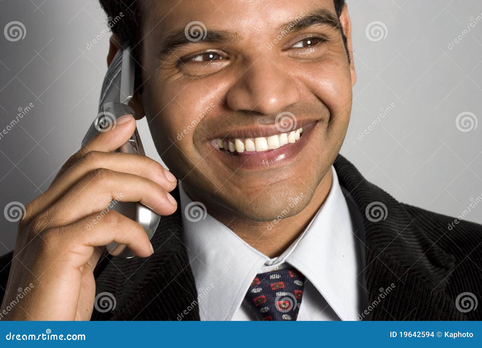 Indian Business Man Calling On Mobile Phone Stock Photo - Image: 19642594