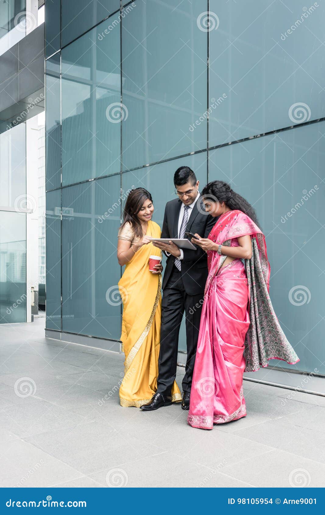Indian Business People Using High-tech Devices during Break Stock Photo ...