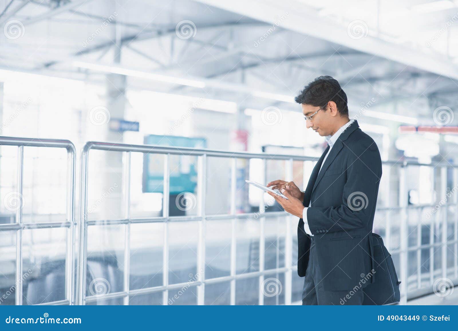 Indian Businessman Using Tablet Computer Stock Image - Image of railway ...