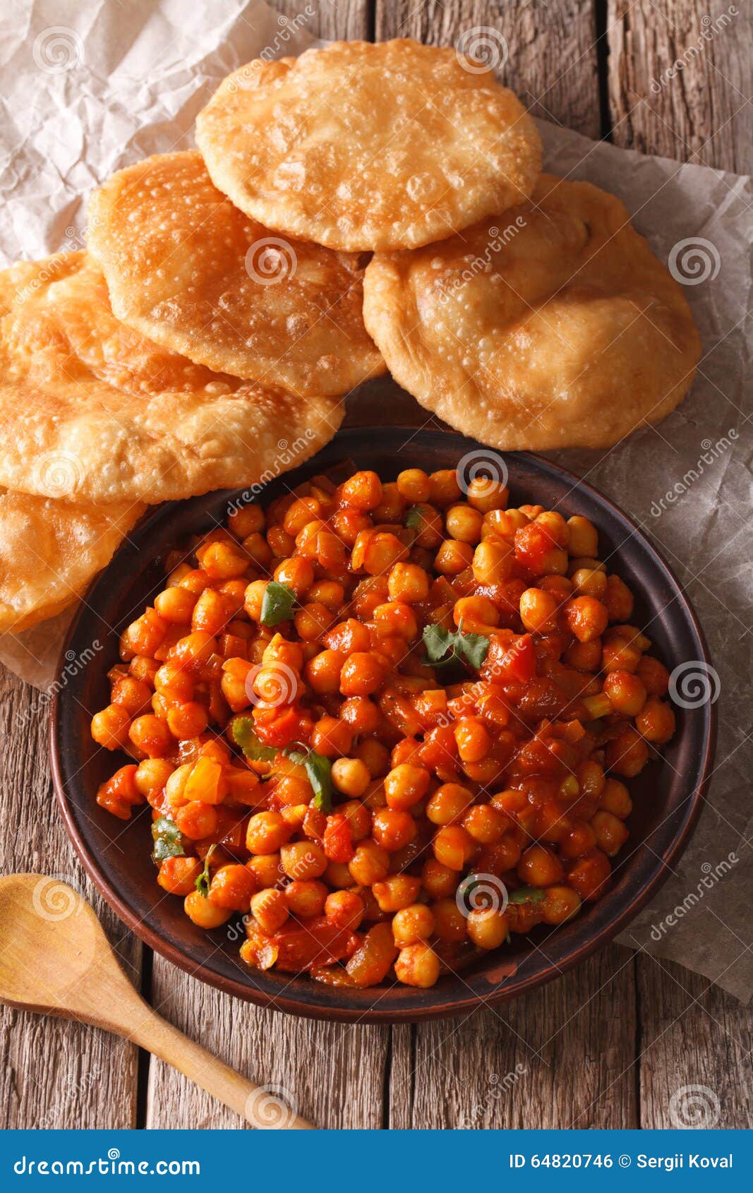 Indian Chana Masala and Puri Bread Close-up. Vertical Stock Photo ...