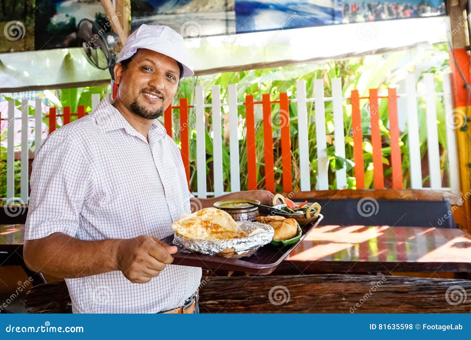 Indian chef serving food stock photo. Image of tray, asian - 81635598
