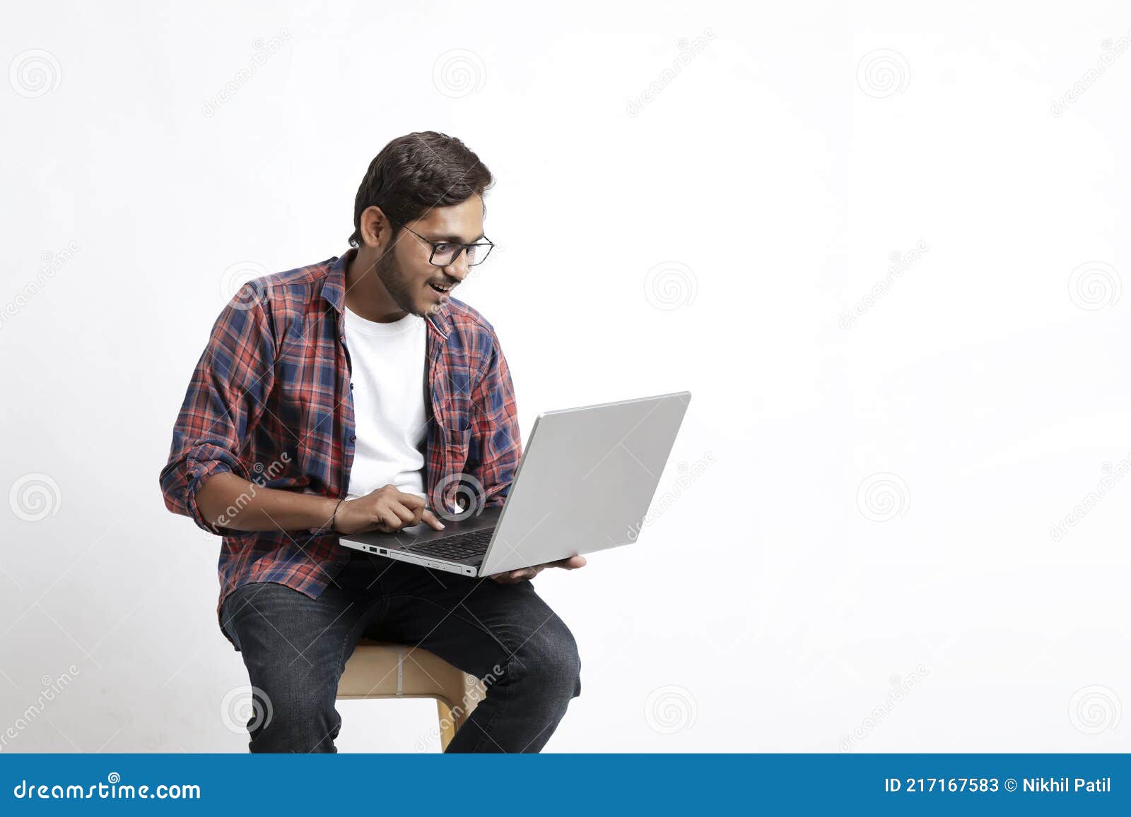 Indian College Student Using Laptop on White Background Stock Image ...