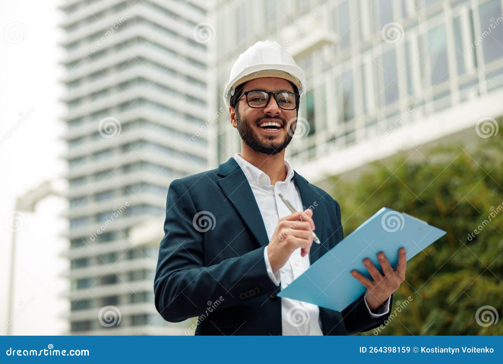 Indian Construction Architect in Suit and Hardhat Making Notes Against ...