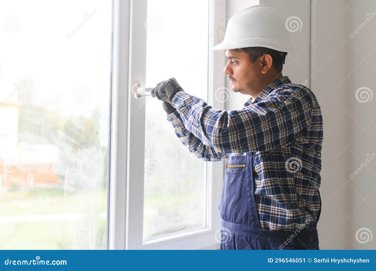 Indian Construction Worker Installing Window in House. Stock Image ...