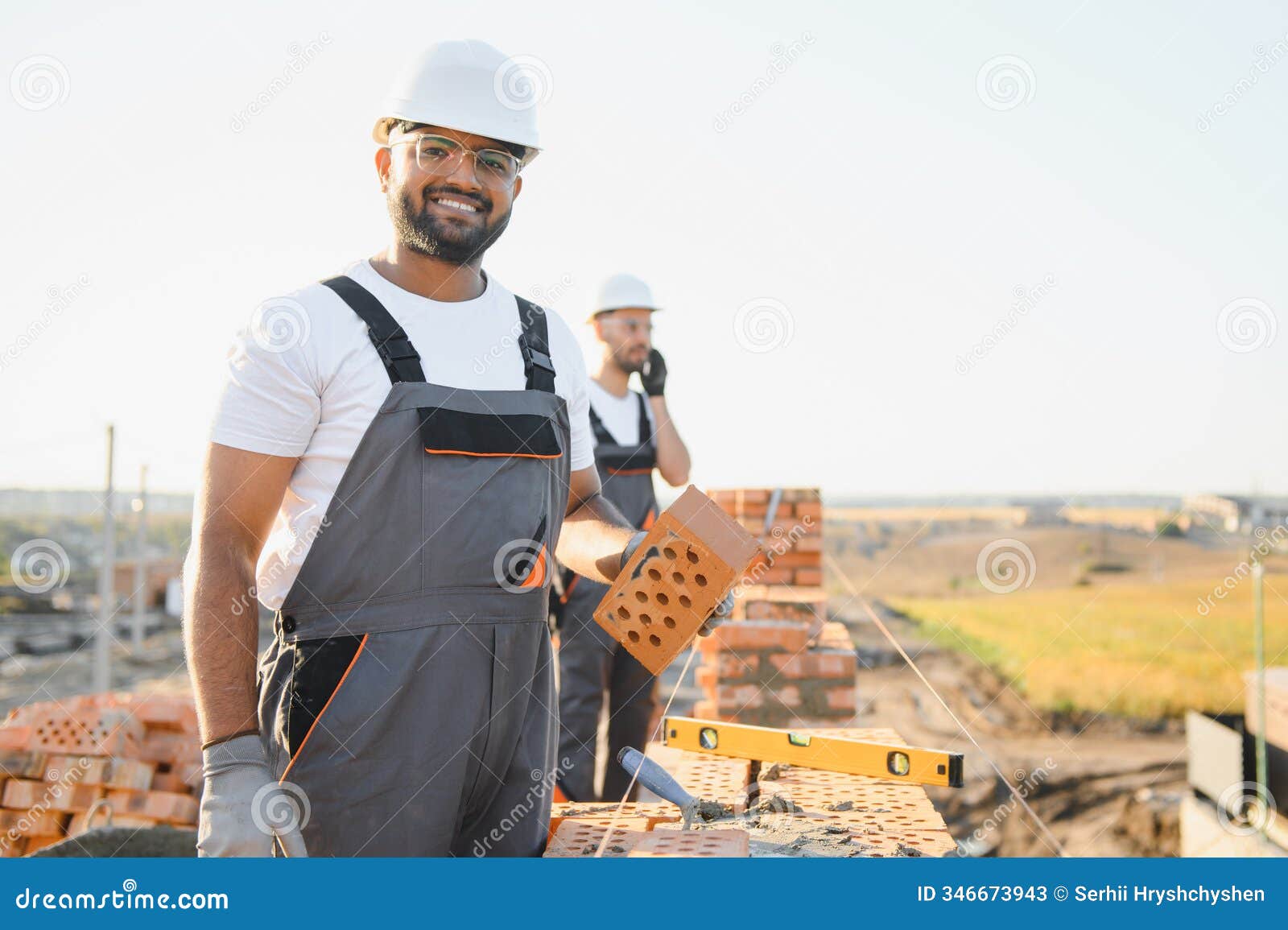 Indian Construction Workers Work on the Construction of a Brick House ...