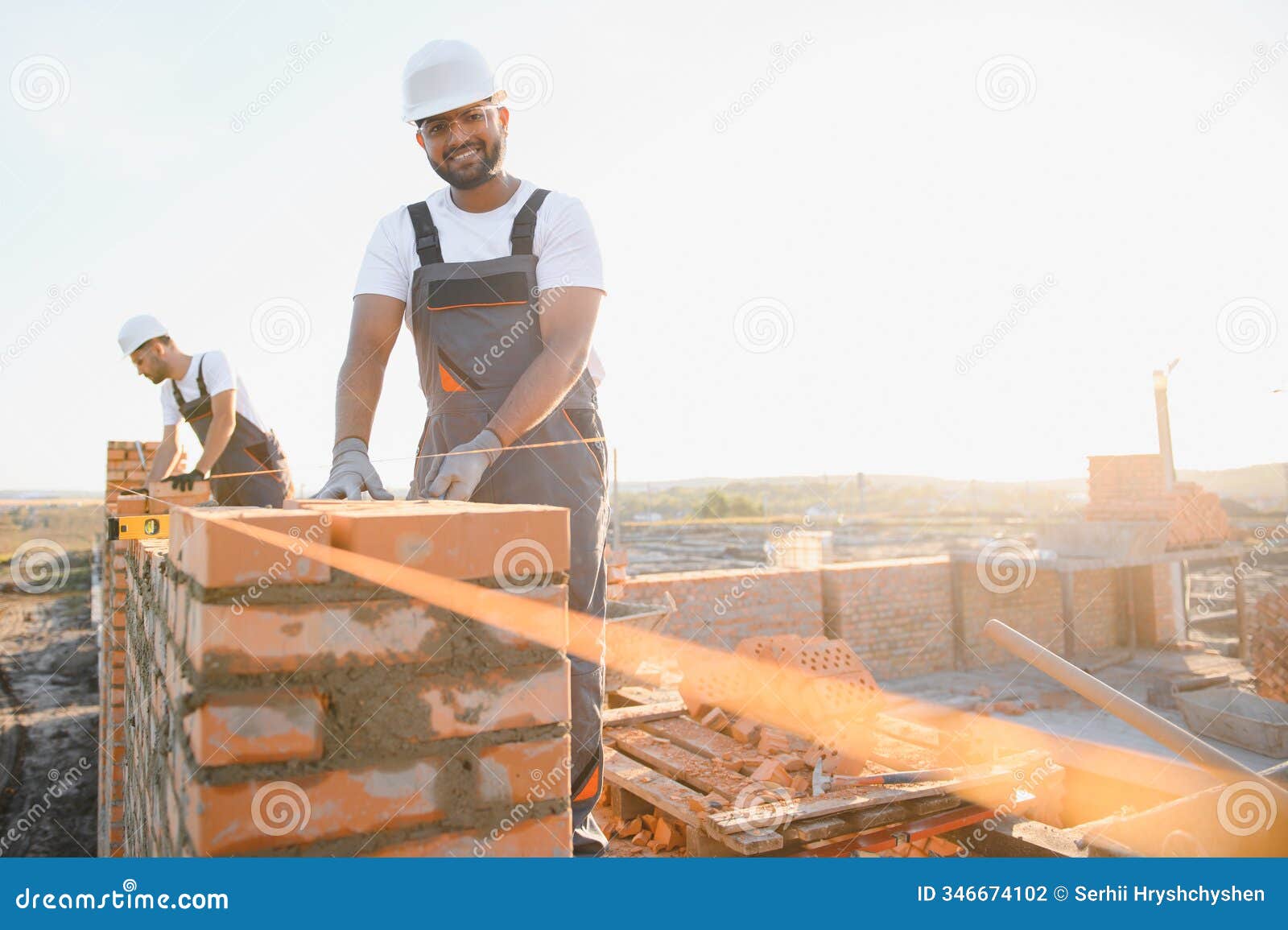 Indian Construction Workers Work on the Construction of a Brick House ...