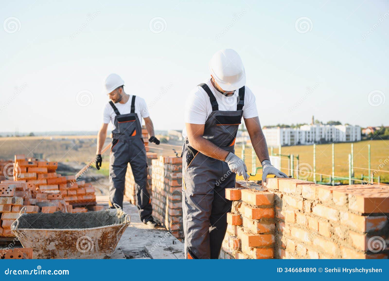 Indian Construction Workers Work on the Construction of a Brick House ...