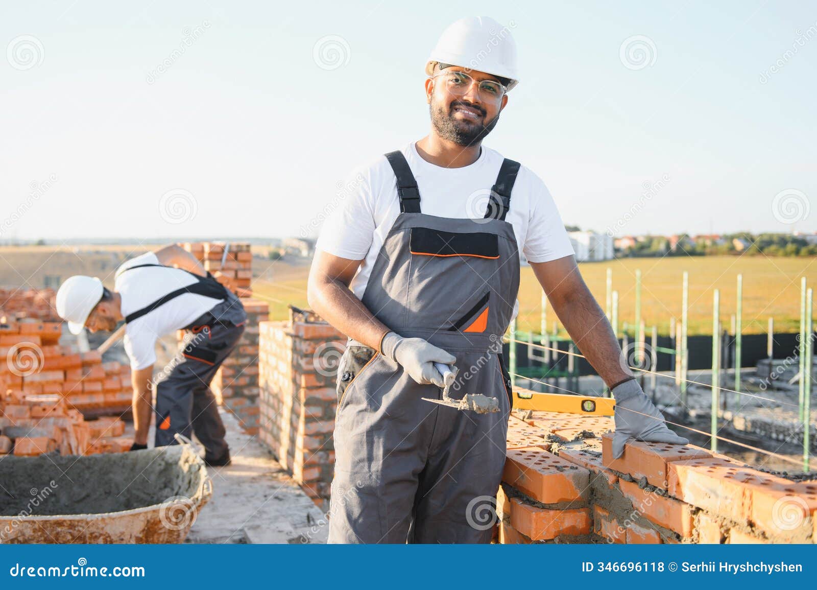 Indian Construction Workers Work on the Construction of a Brick House ...