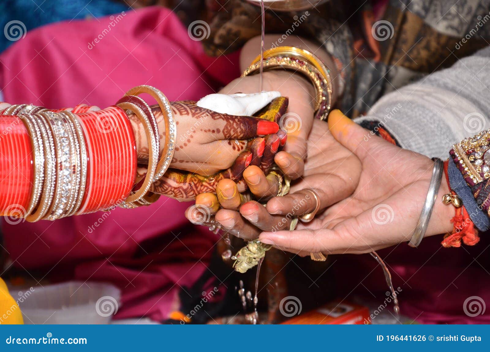 An Indian Couple Performing Ritual on Their Wedding Ceremony. Stock ...