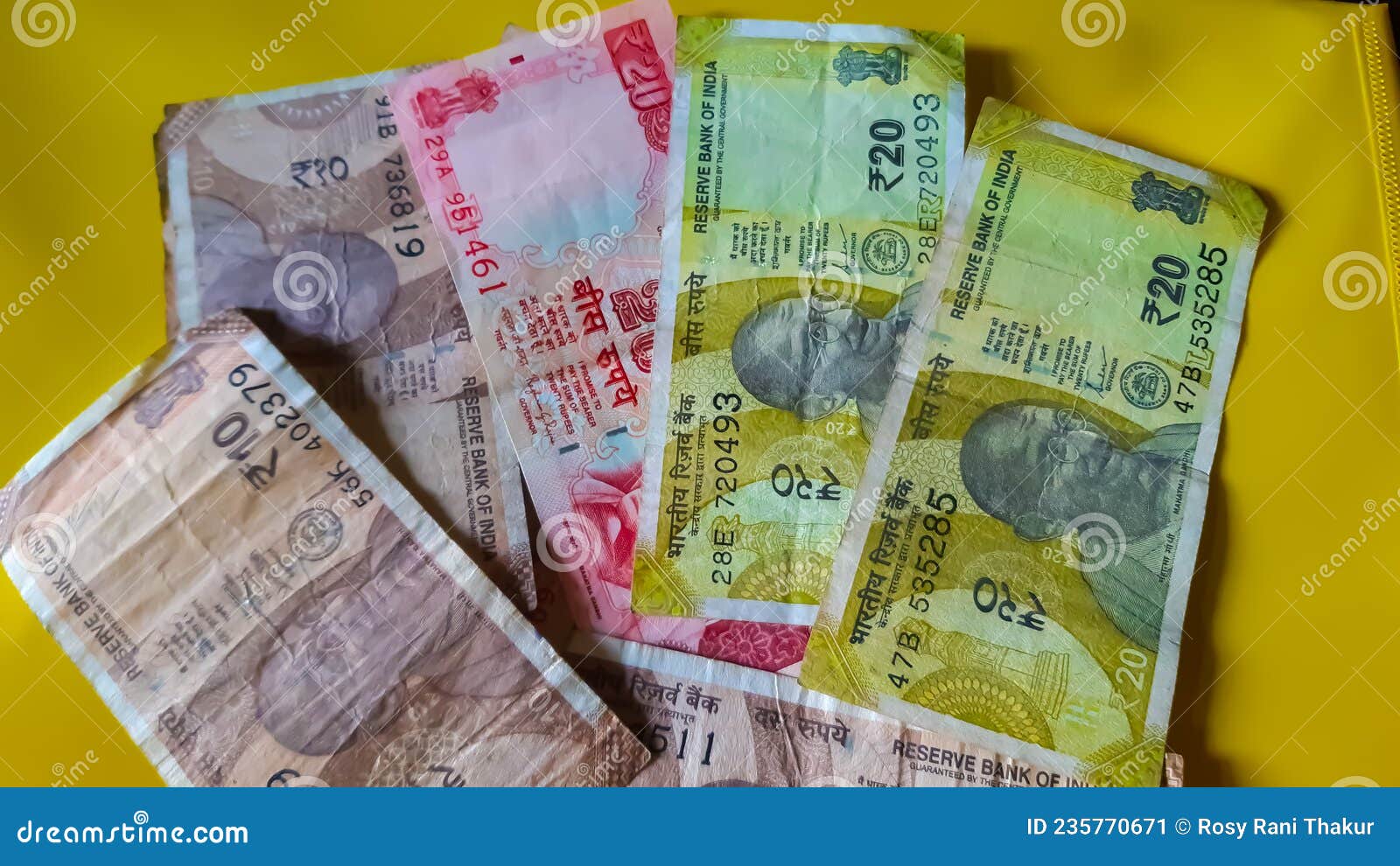 Indian Currency Rupee Notes. Background Yellow Stock Image - Image of ...