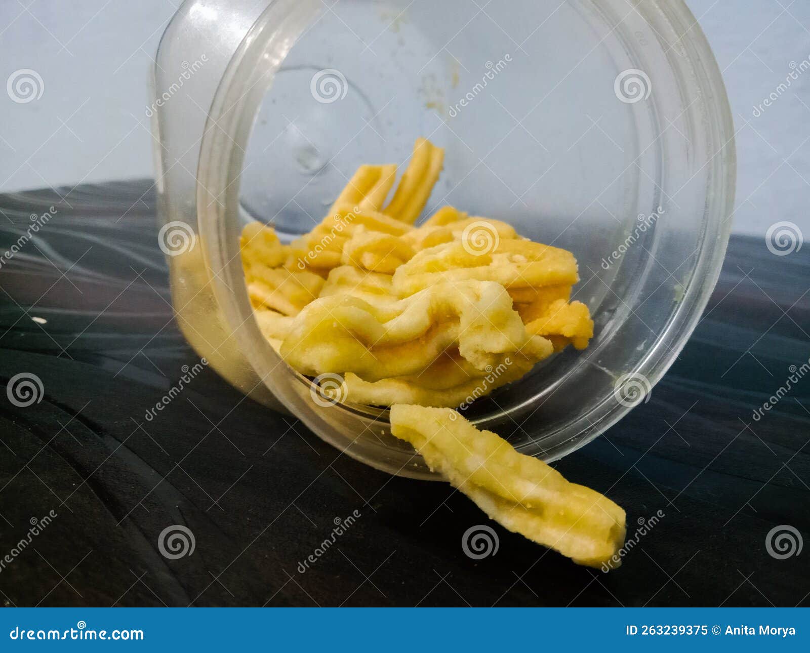 Indian Deep Fried Snack Gathia in Plastic Container Stock Image - Image ...
