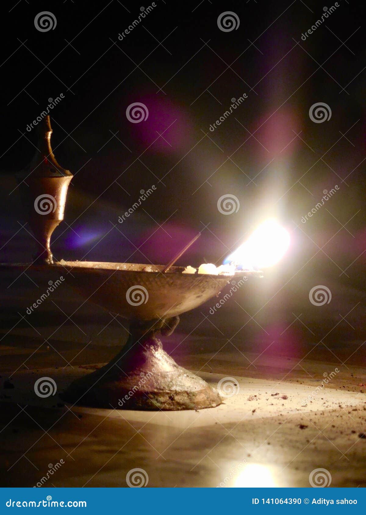 Goleden indian deepak stock photo. Image of lighed, beach - 141064390