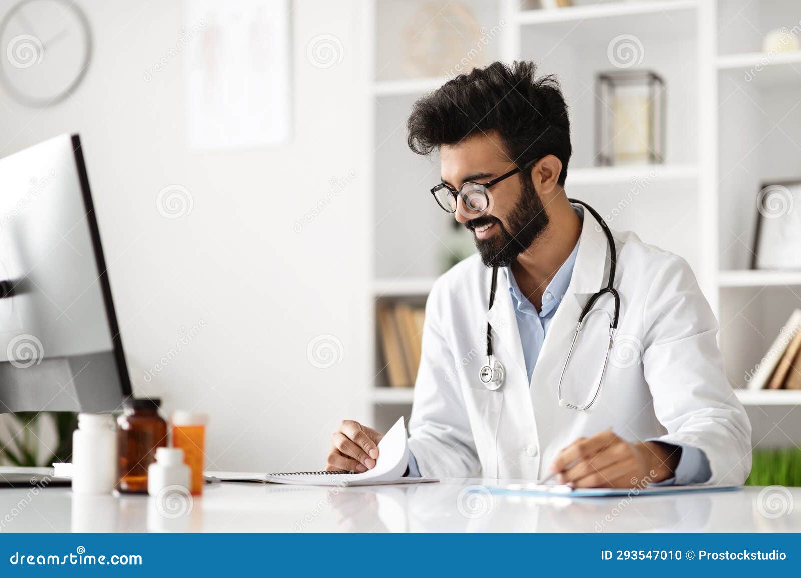 Indian Doctor Engaged in Work at Clinic Computer Stock Photo - Image of ...