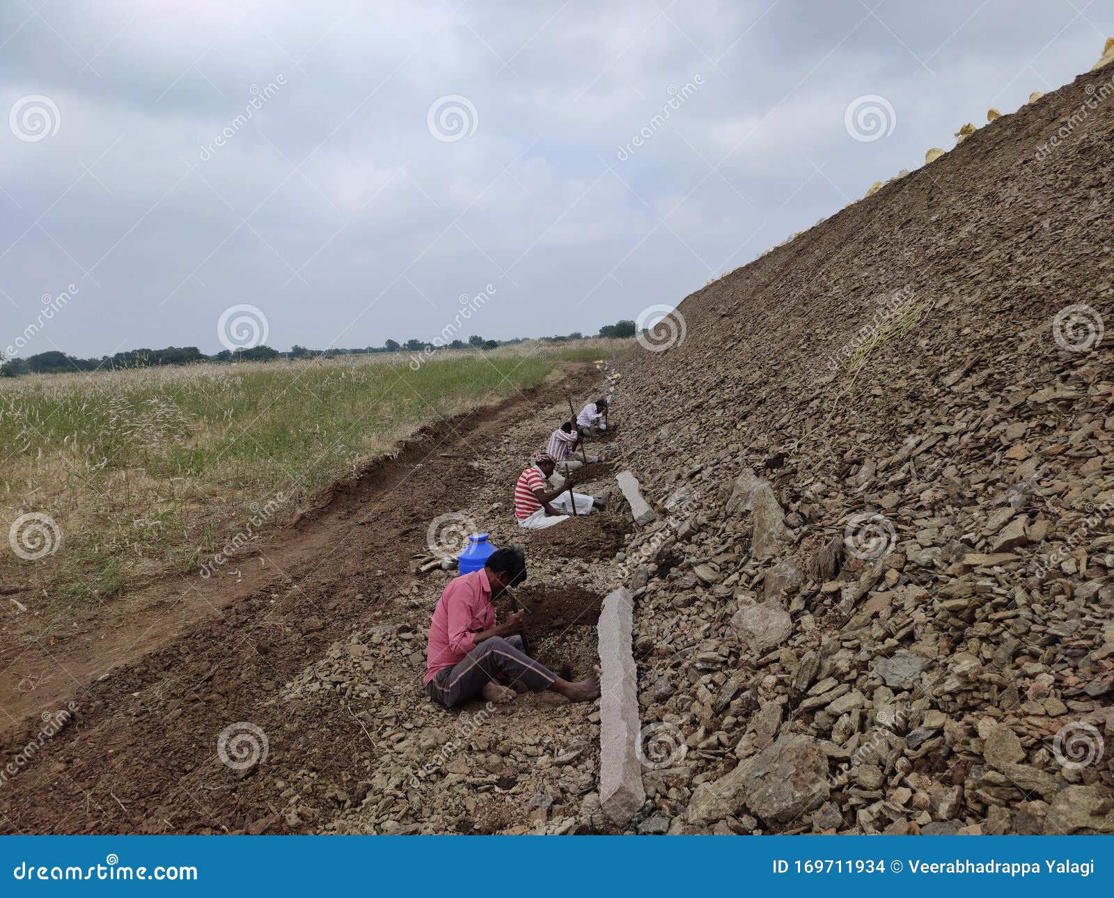 Indian Farmer Digging Pits for Stone Pillars Editorial Stock Image ...