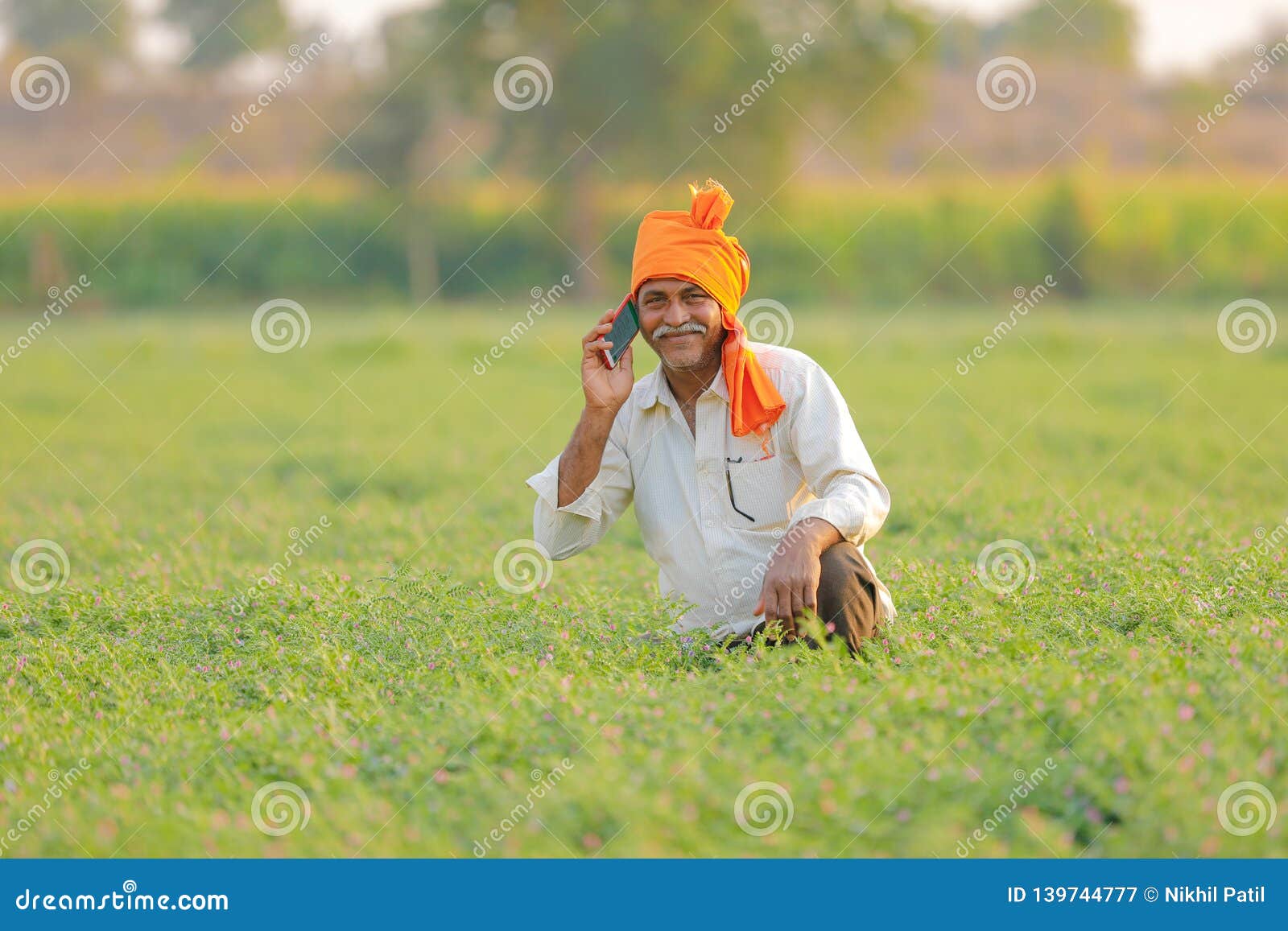Indian Farmer Using Mobile Phone at Chickpea Field Stock Image - Image ...