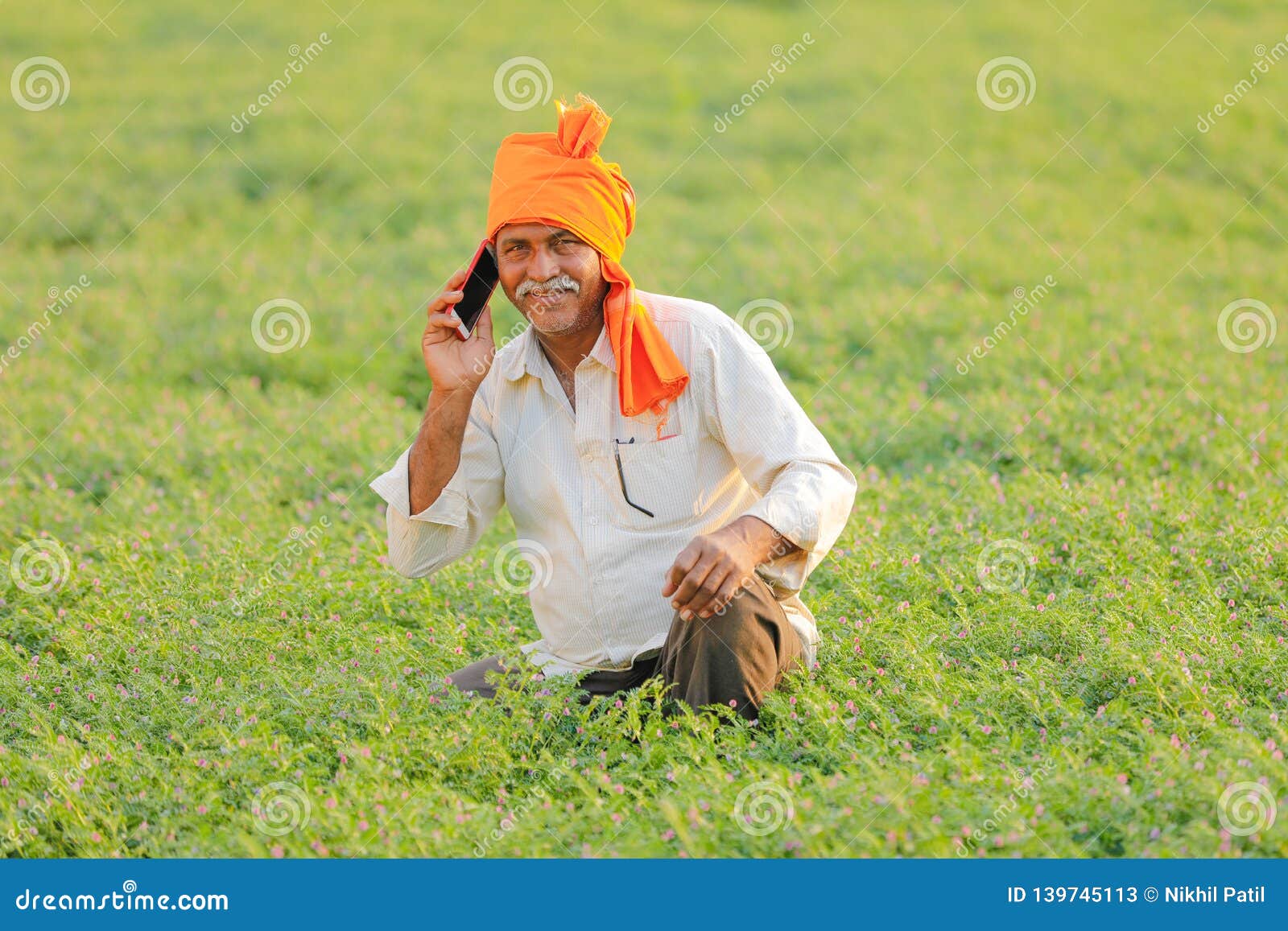 Indian Farmer Using Mobile Phone at Chickpea Field Stock Image - Image ...