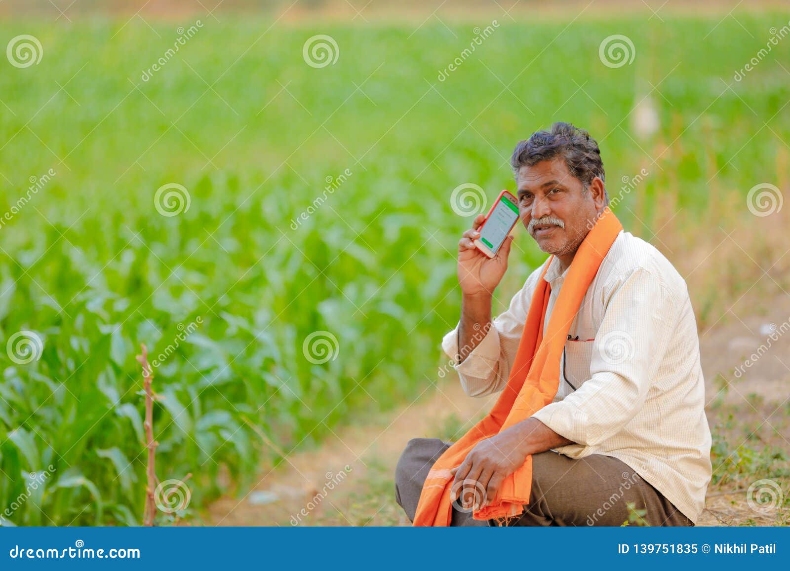 Indian Farmer Using Mobile Phone at Corn Field Stock Image - Image of ...