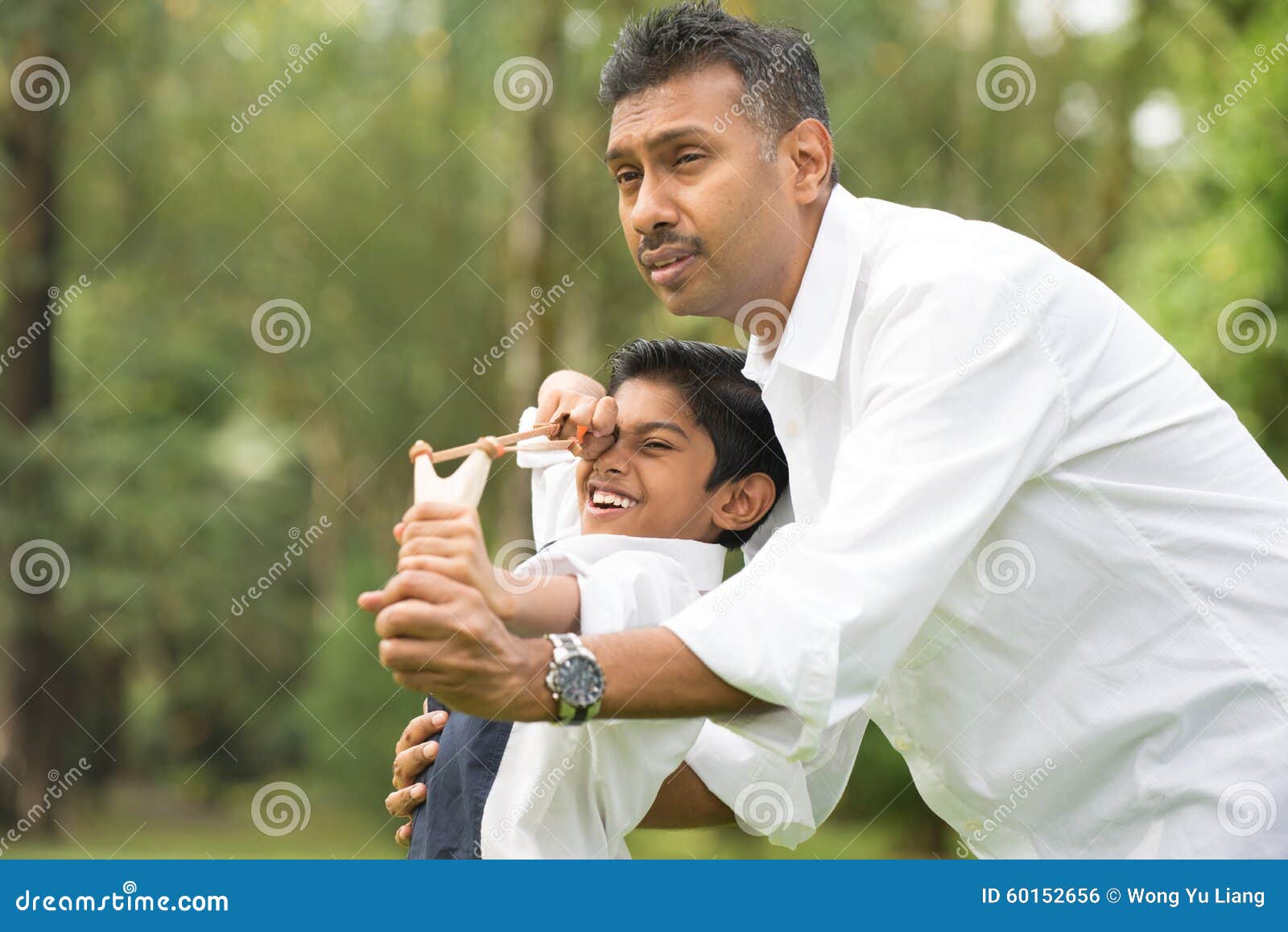 Indian Father and Son Playing Stock Photo - Image of game, wooden: 60152656