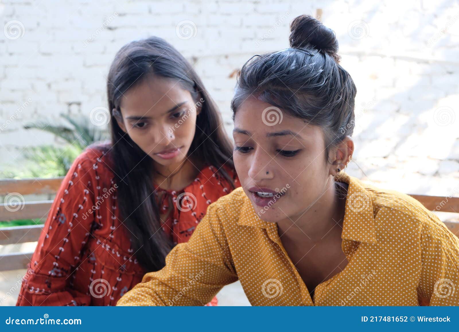 Indian Female Friends Talking and Discussing Something Stock Photo ...