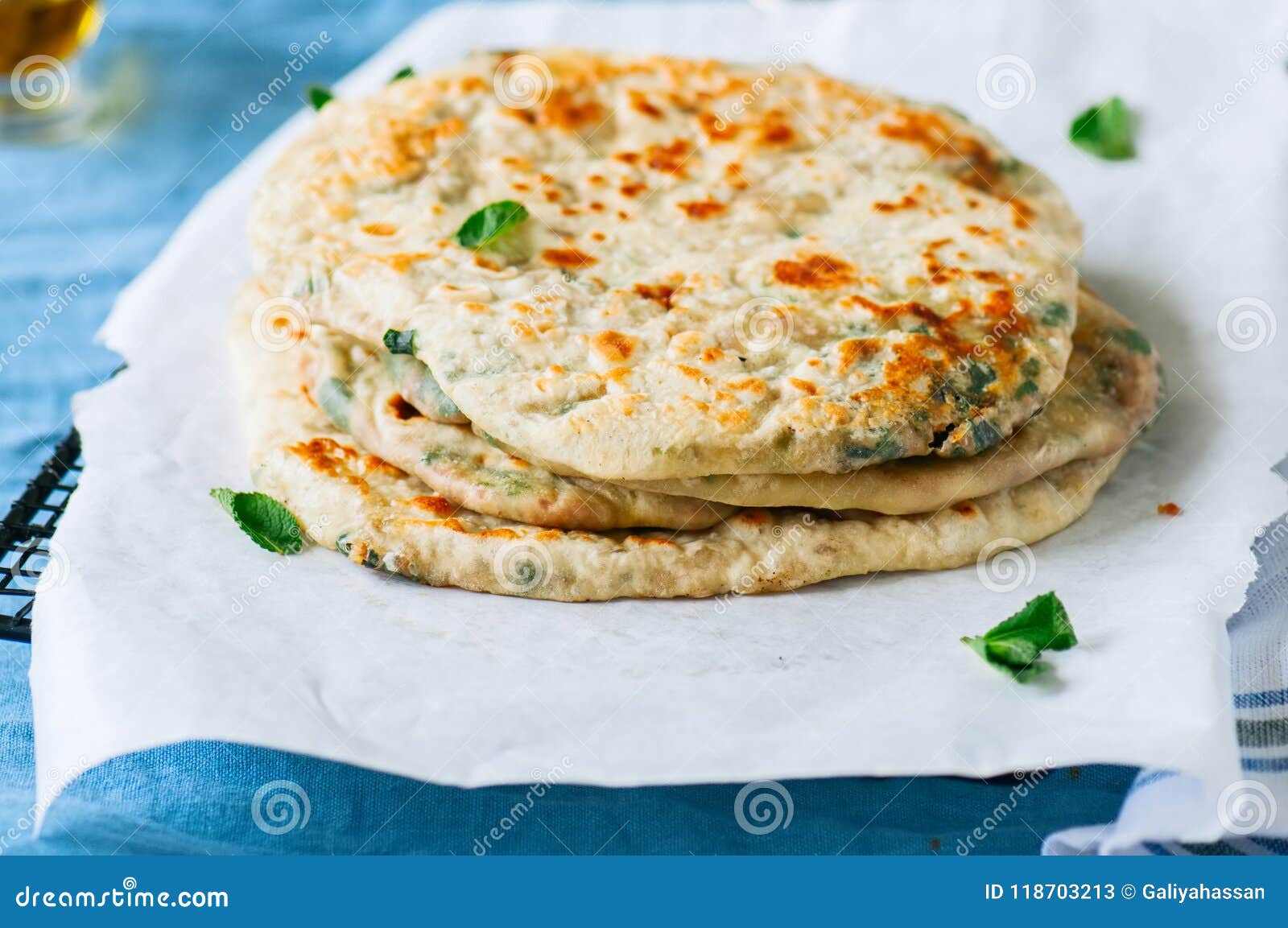 Indian Flatbread.Herb Stuffed Paratha on a Baking Paper Stock Image ...