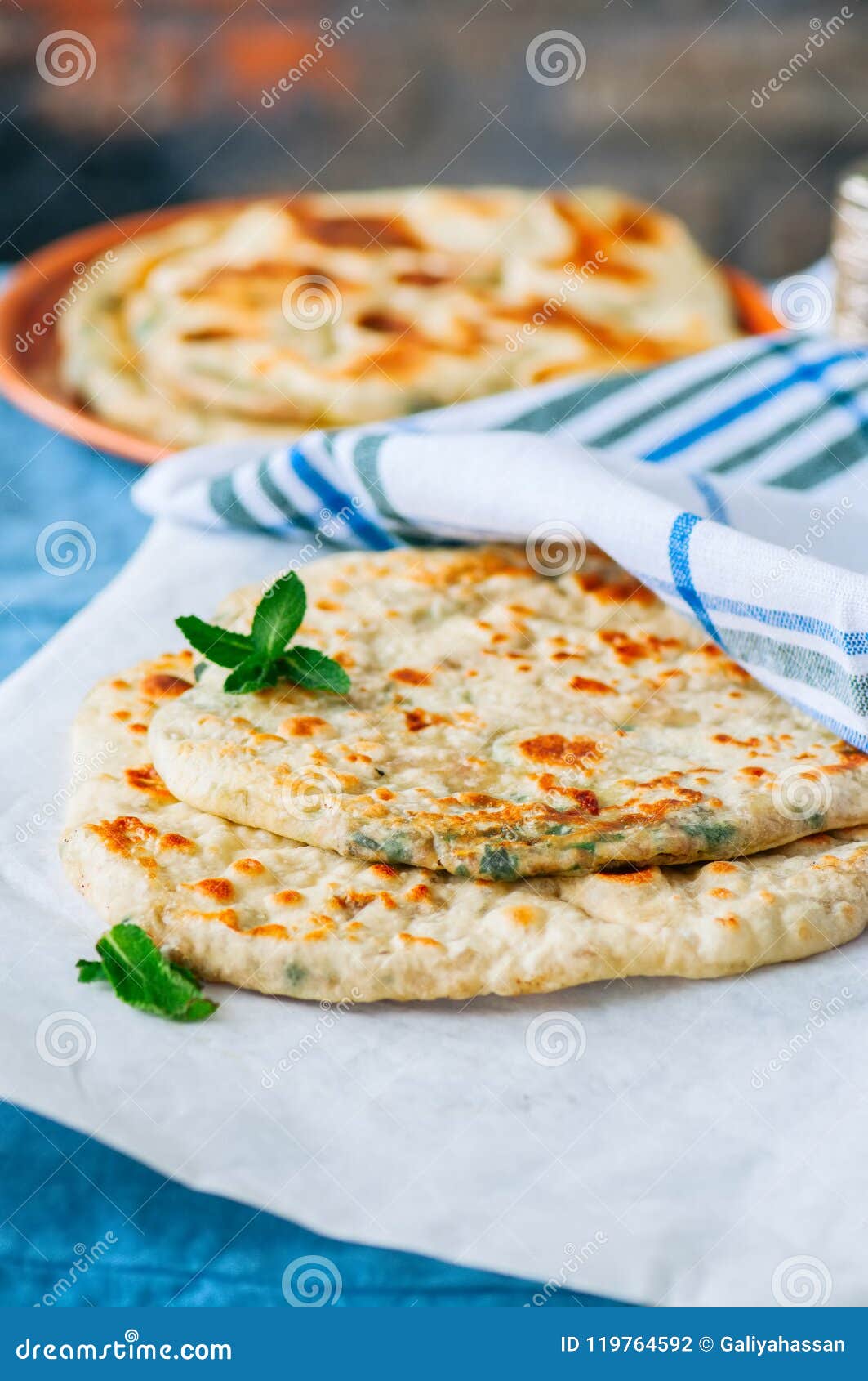 Herb Stuffed Paratha On A Baking Paper Stock Photography ...