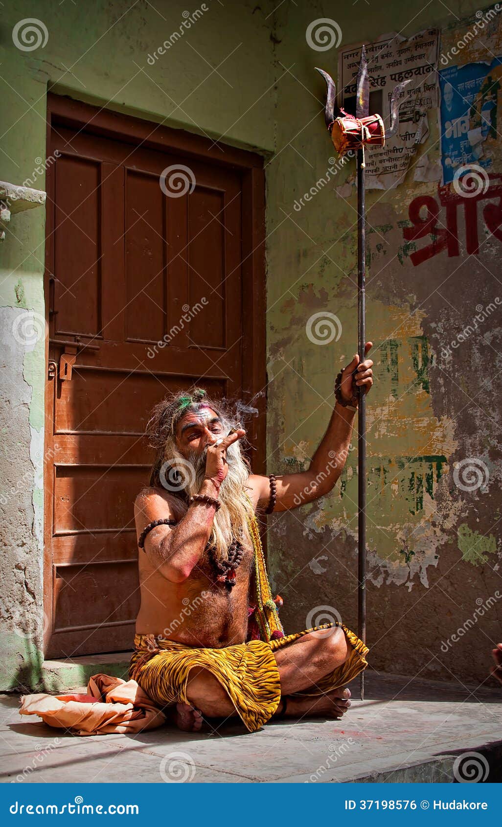 Indian Guru Smoking Ganja editorial photo. Image of brahman - 37198576