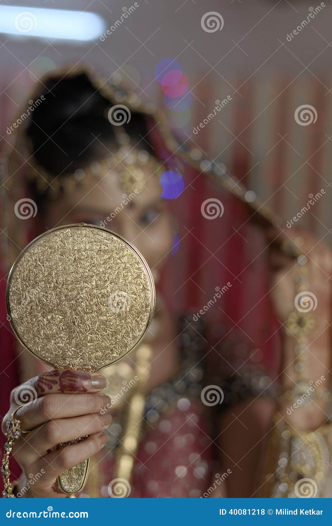 Indian Hindu Bride Getting Ready Looking into a Mi Stock Photo - Image ...