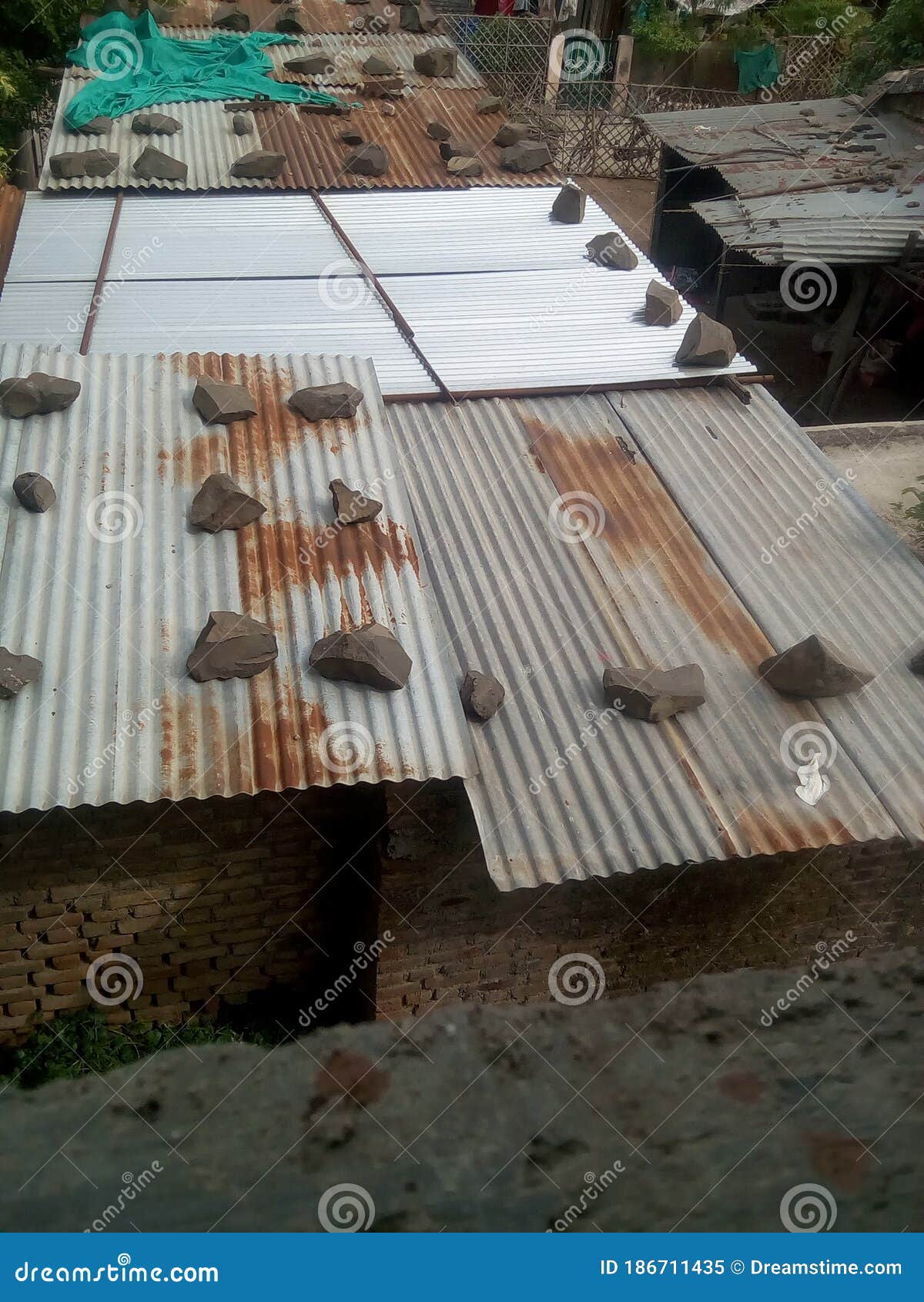 INDIAN-HUT with TIN on ROOF Stock Image - Image of bricks, round: 186711435