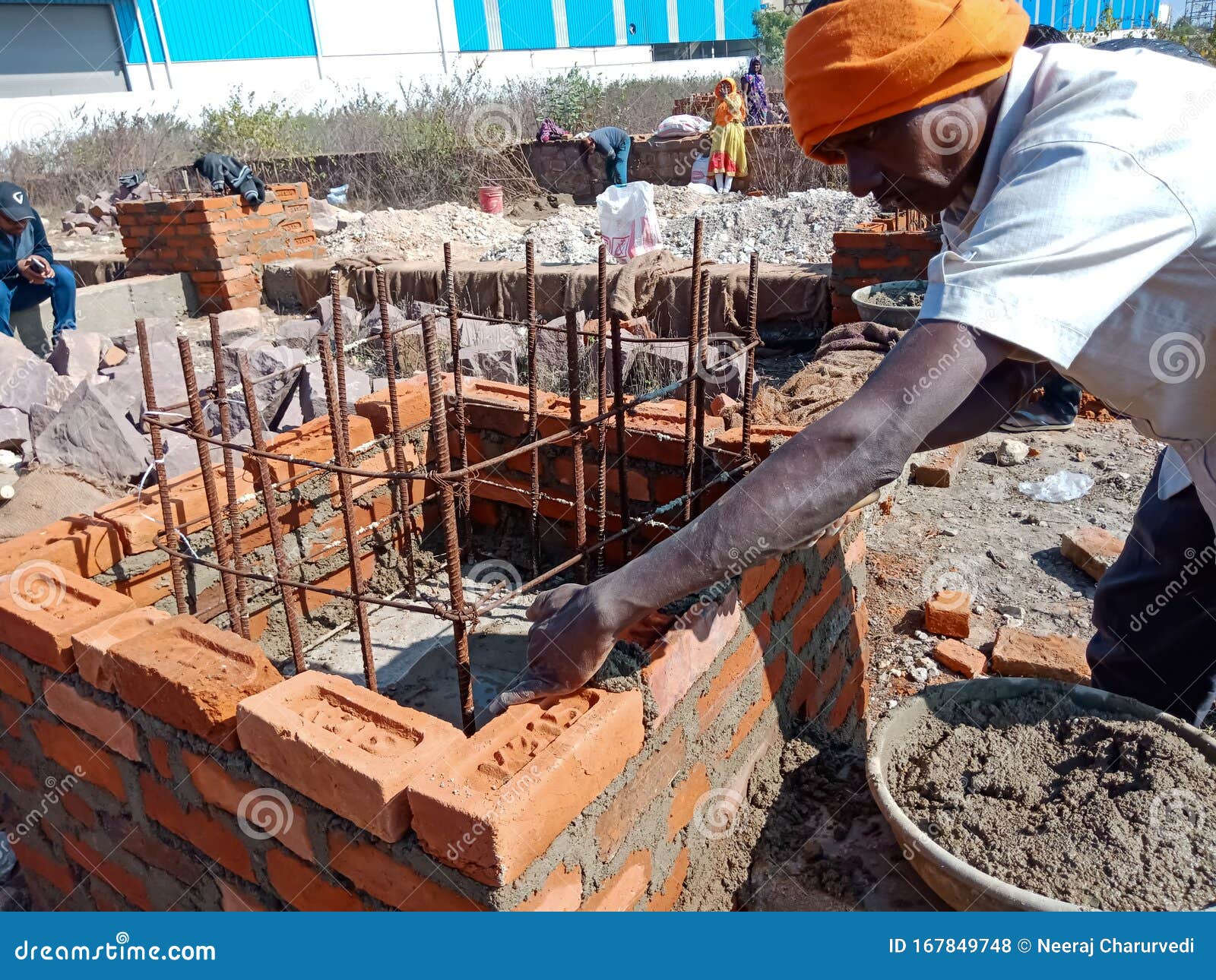 An Indian Labour Fixing Wall from Cement Material and Bricks in India ...