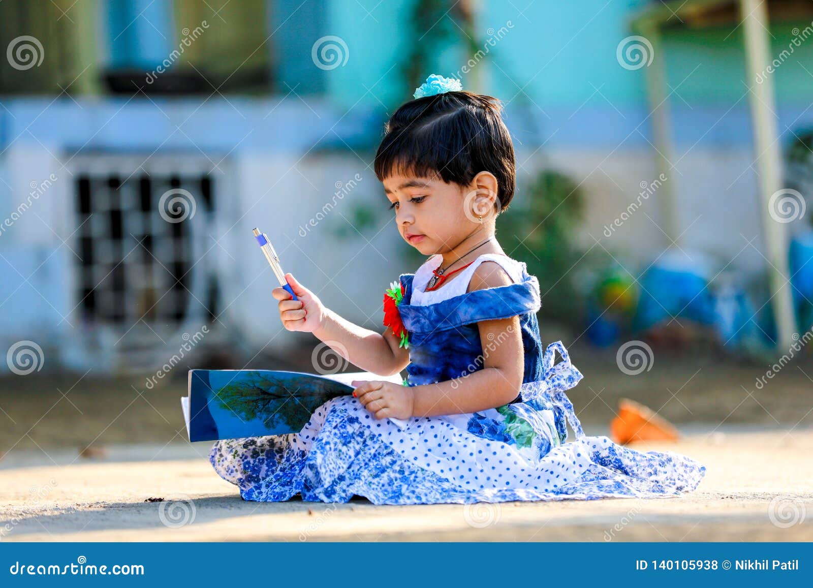 Indian Little Girl Child Writing on Note Book , Studying Stock Photo ...