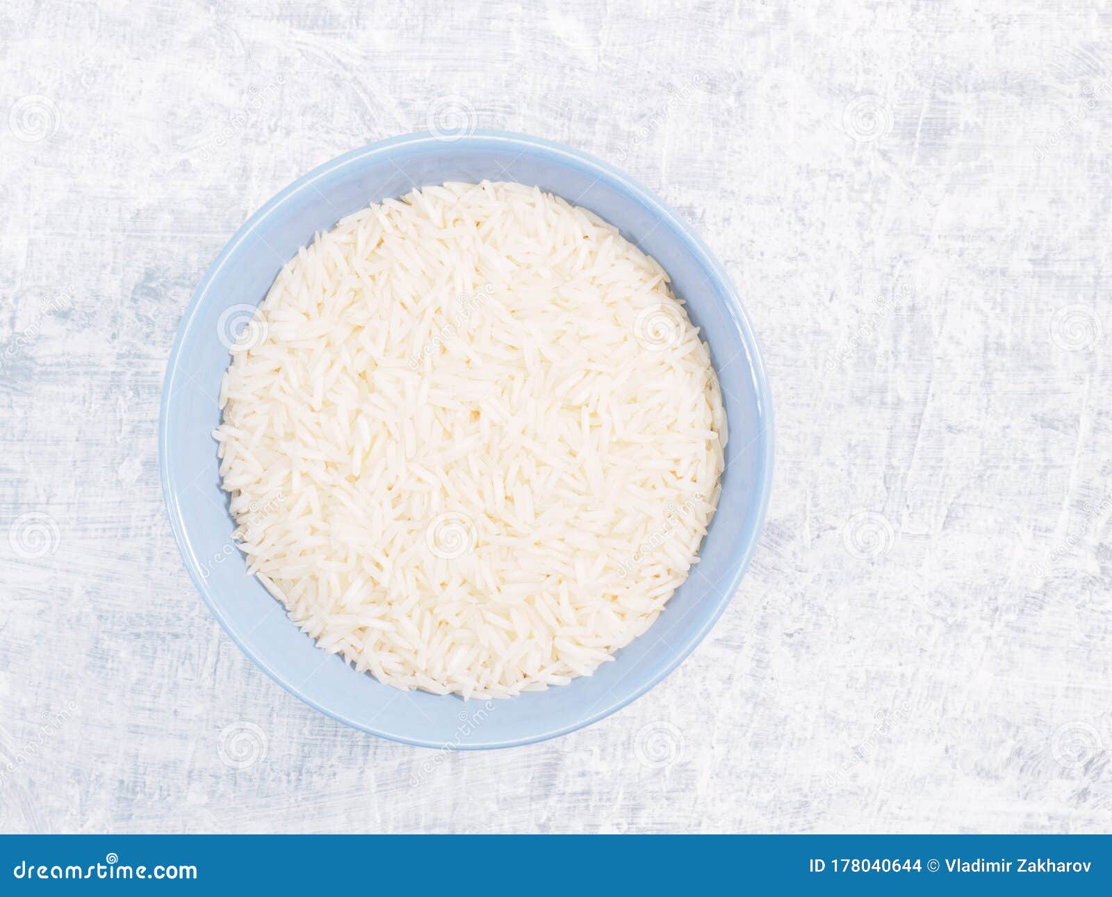 Indian Long Grain Basmati Rice in Blue Ceramic Bowl Stock Photo - Image ...